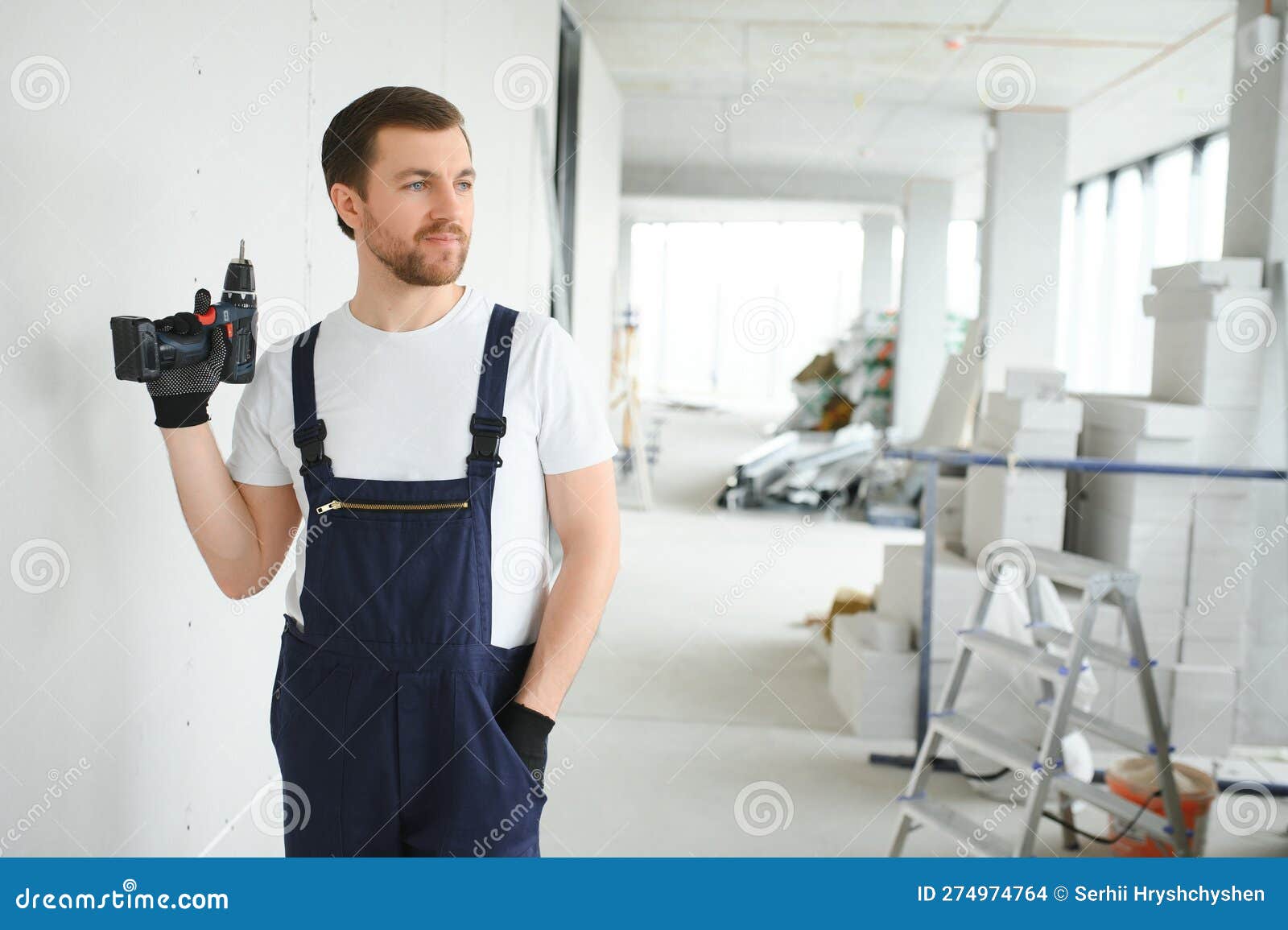Man Drywall Worker Installing Plasterboard Sheet To Wall. Stock Photo ...
