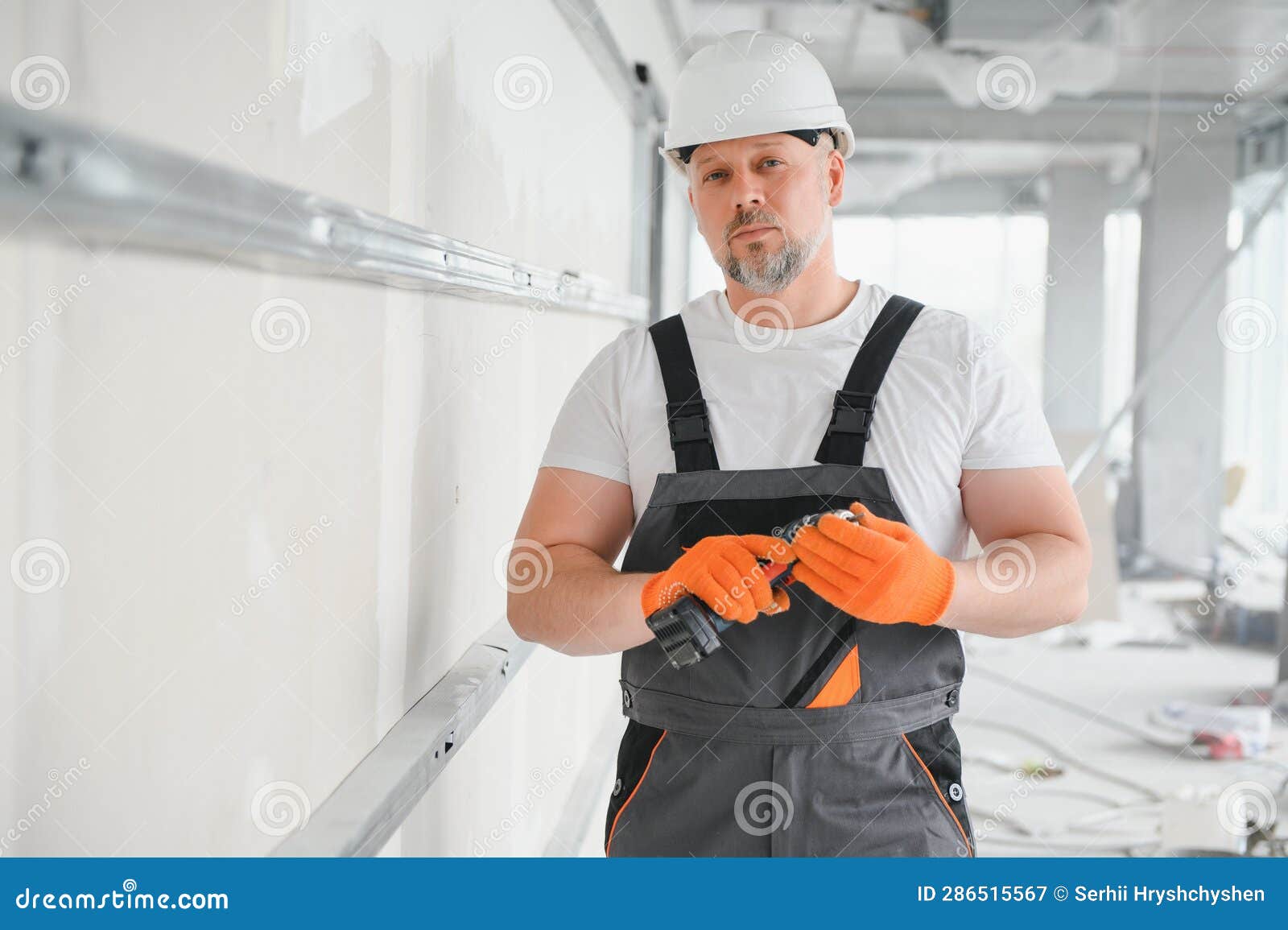 Man Drywall Worker Installing Plasterboard Sheet To Wall Stock Image ...