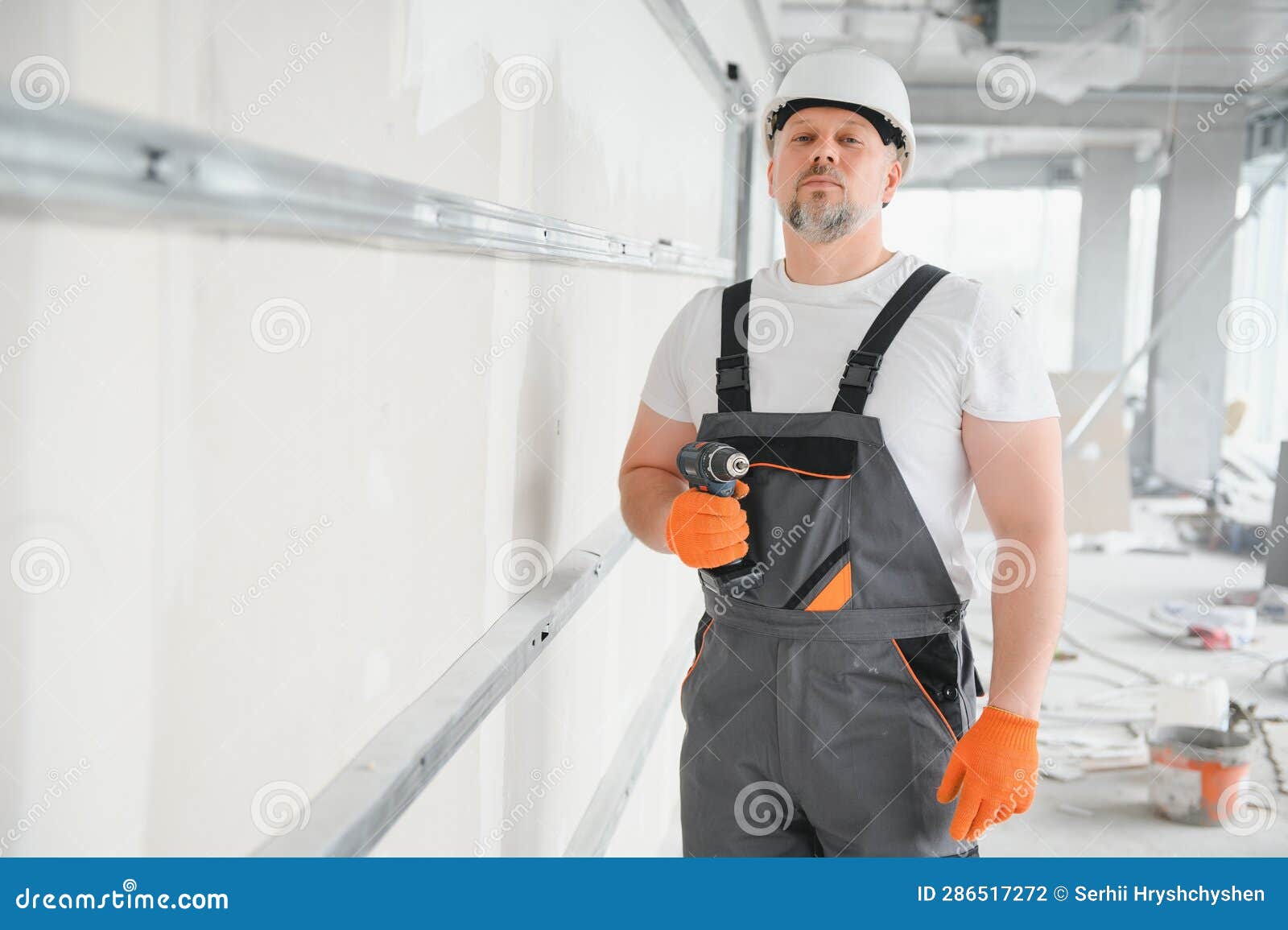 Man Drywall Worker Installing Plasterboard Sheet To Wall Stock Photo ...