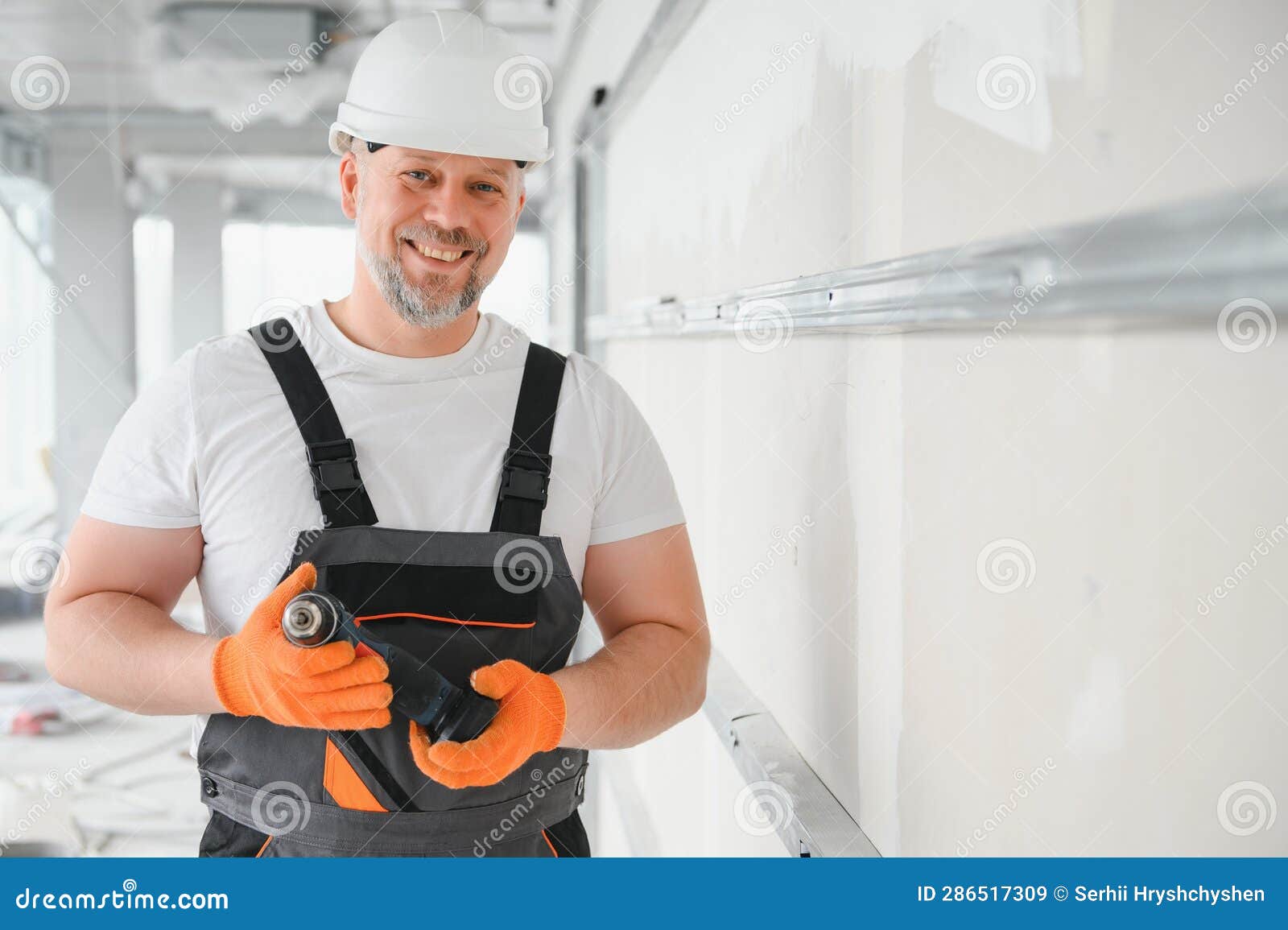 Man Drywall Worker Installing Plasterboard Sheet To Wall Stock Image ...