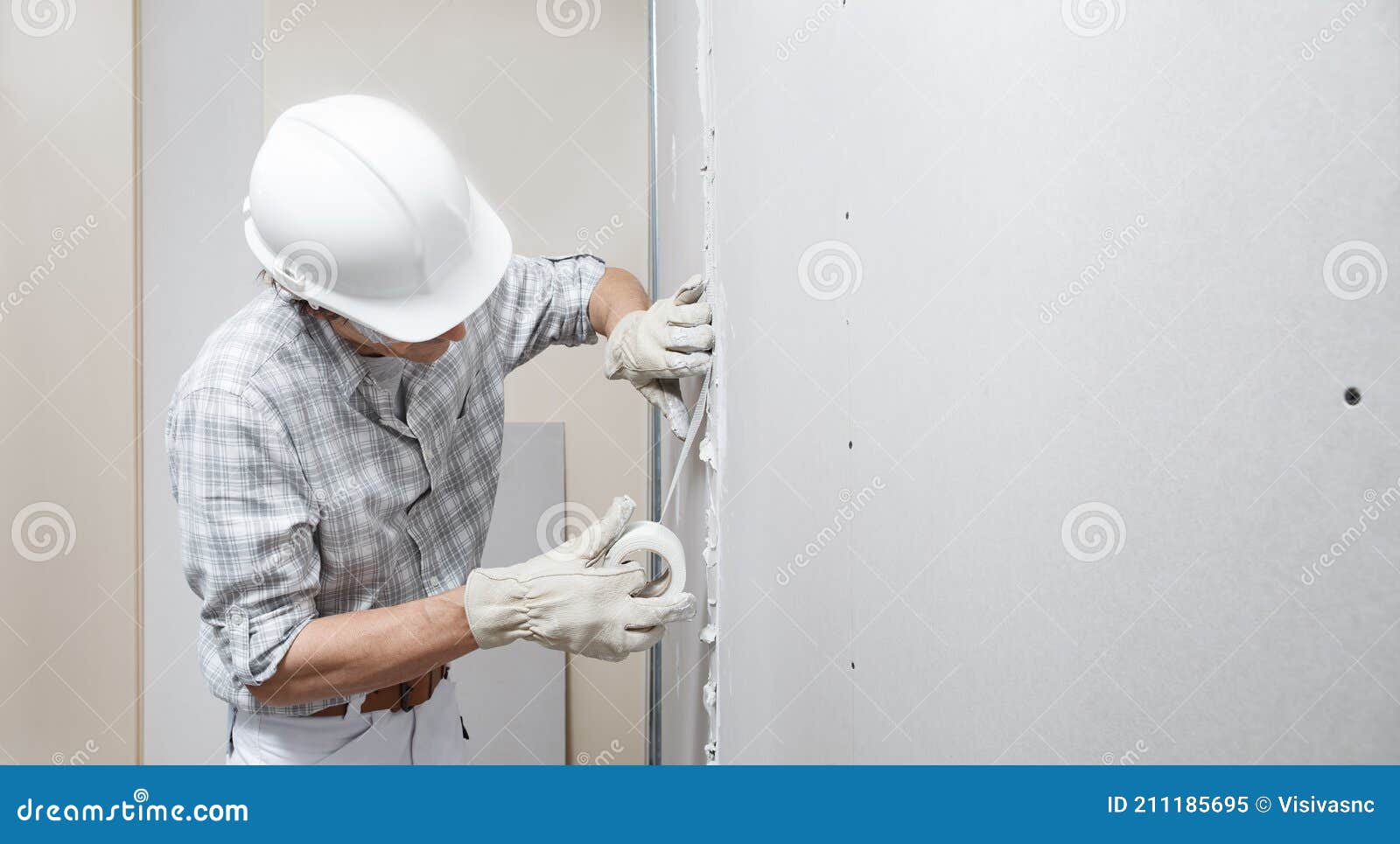 Man Drywall Worker or Plasterer Putting Mesh Tape for Plasterboard on a ...