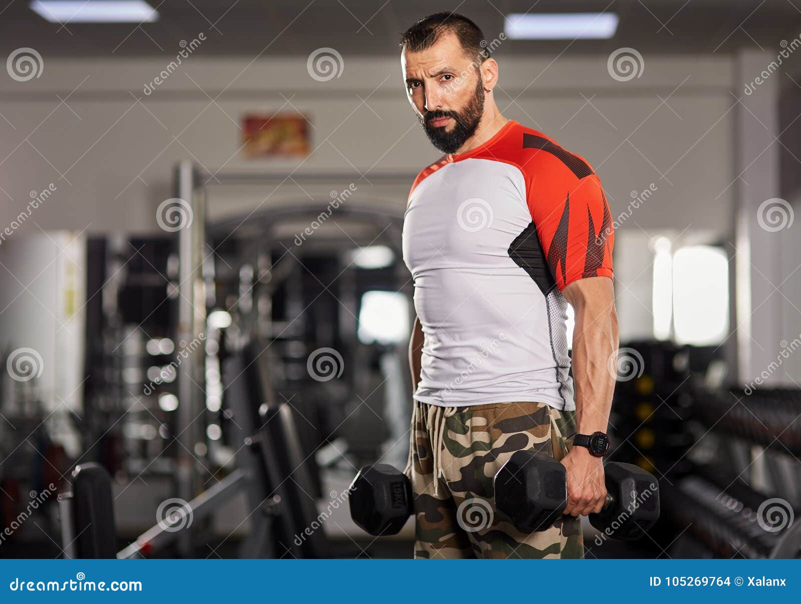 Man Doing Workout with Dumbbells Stock Photo - Image of blurred, adult ...