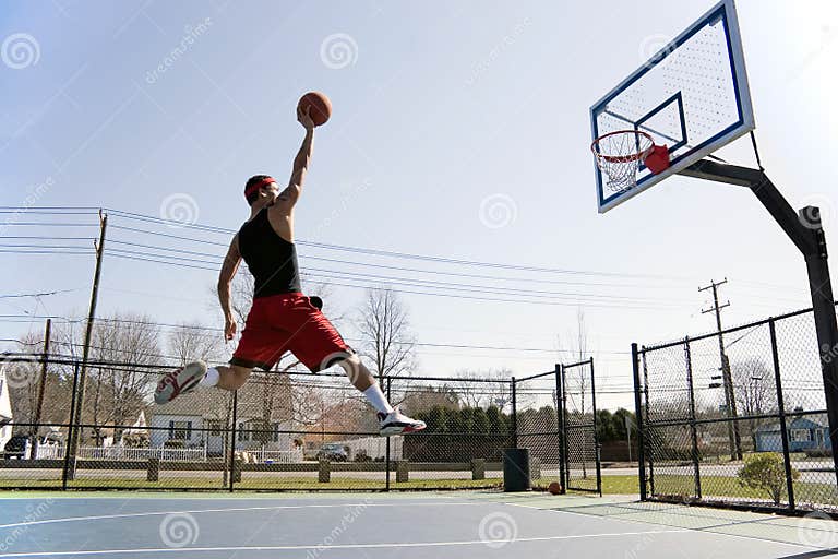Man Dunking the Basketball stock image. Image of athletic - 19167075