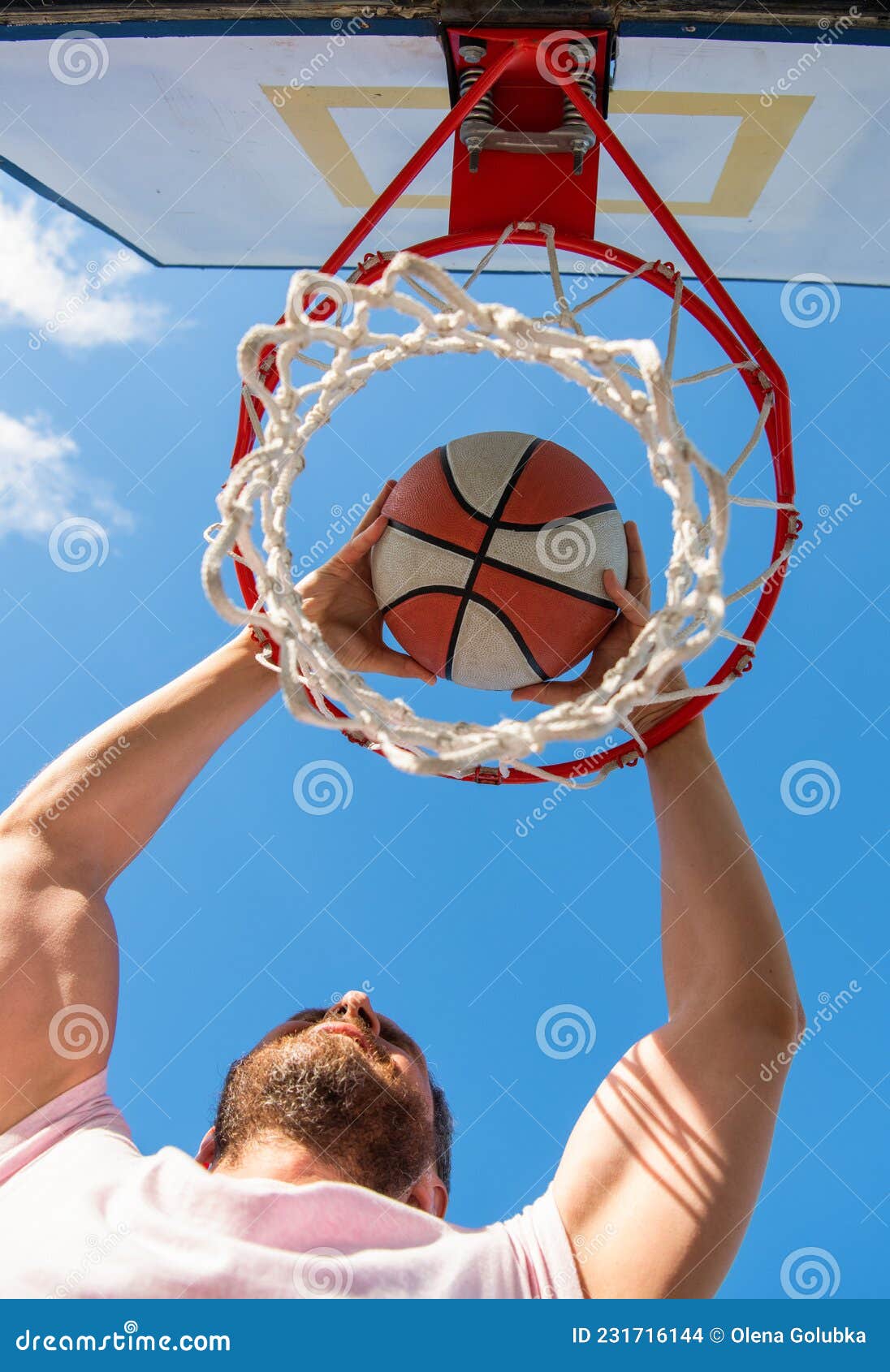Man Dunking Basketball Ball through Net Ring with Hands, Success Stock ...
