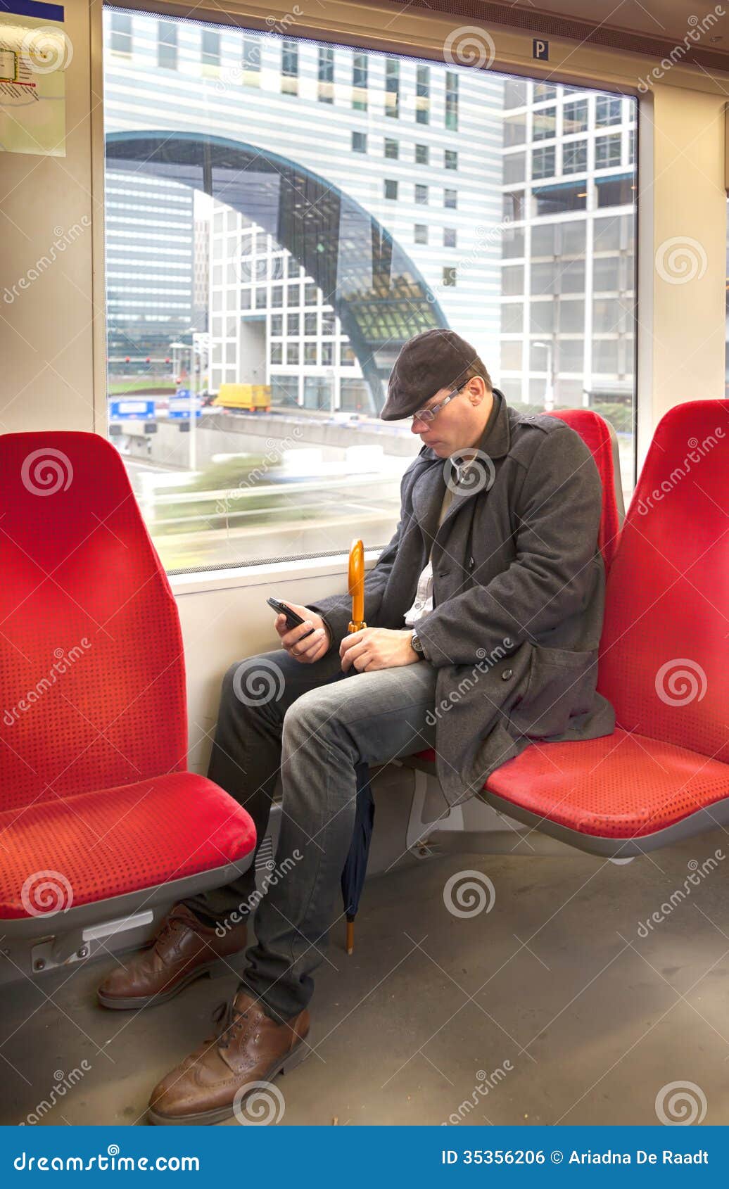 Man in dutch train stock photo. Image of passenger, computer - 35356206