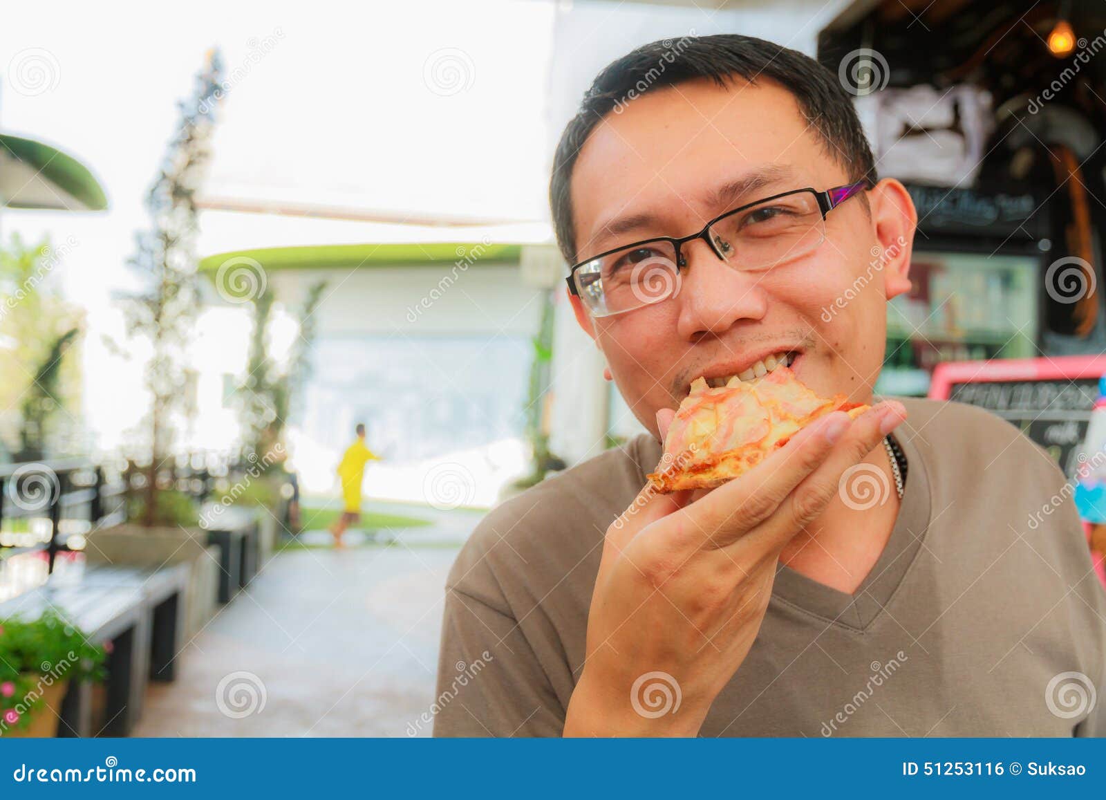 Man eat pizza stock photo. Image of dinner, pepperoni - 51253116