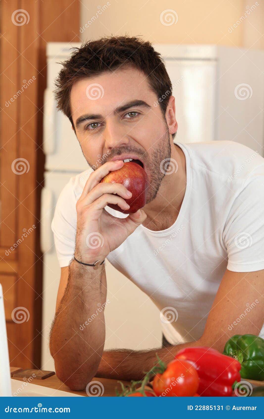 Man eating an apple stock image. Image of food, tomatoes - 22885131