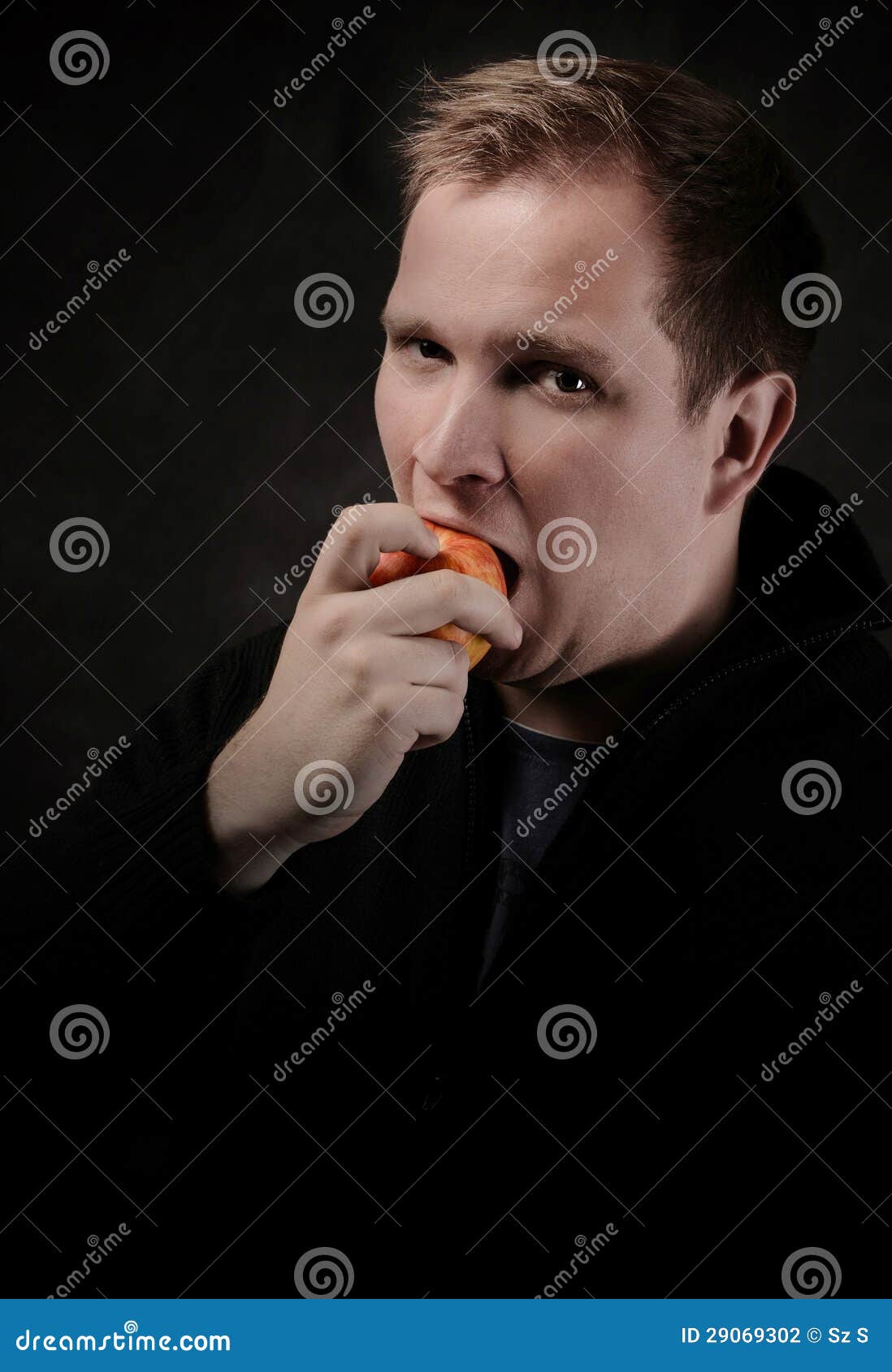 Man eating an apple stock photo. Image of smart, meal - 29069302