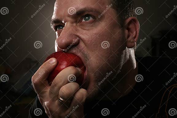 Man eating apple stock photo. Image of healthy, aggressive - 7087164