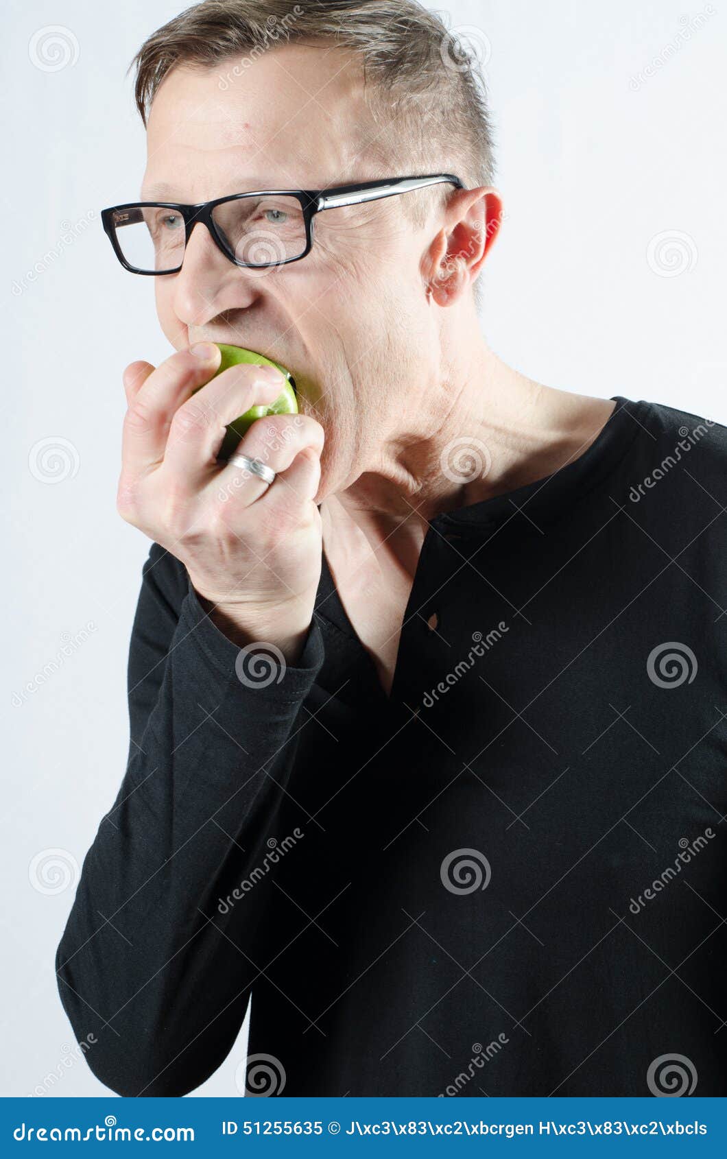 Man eating apple stock image. Image of ager, relaxed - 51255635