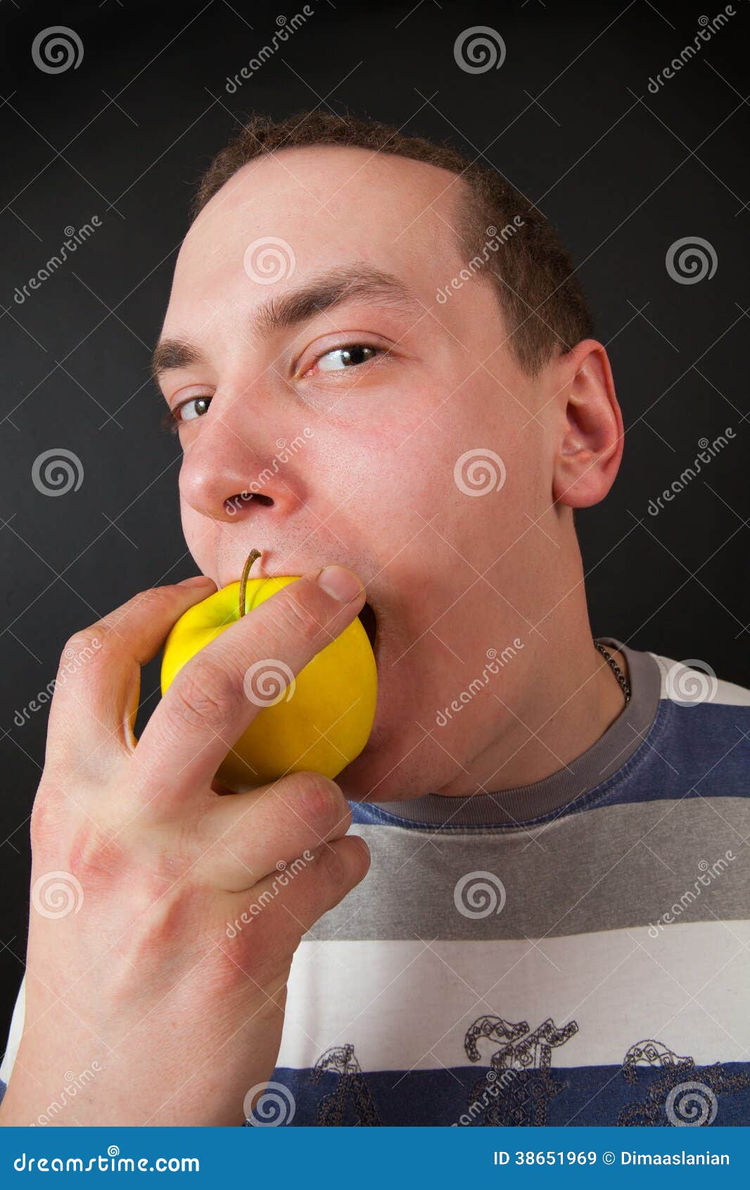 Man eating an apple stock image. Image of handsome, nature - 38651969