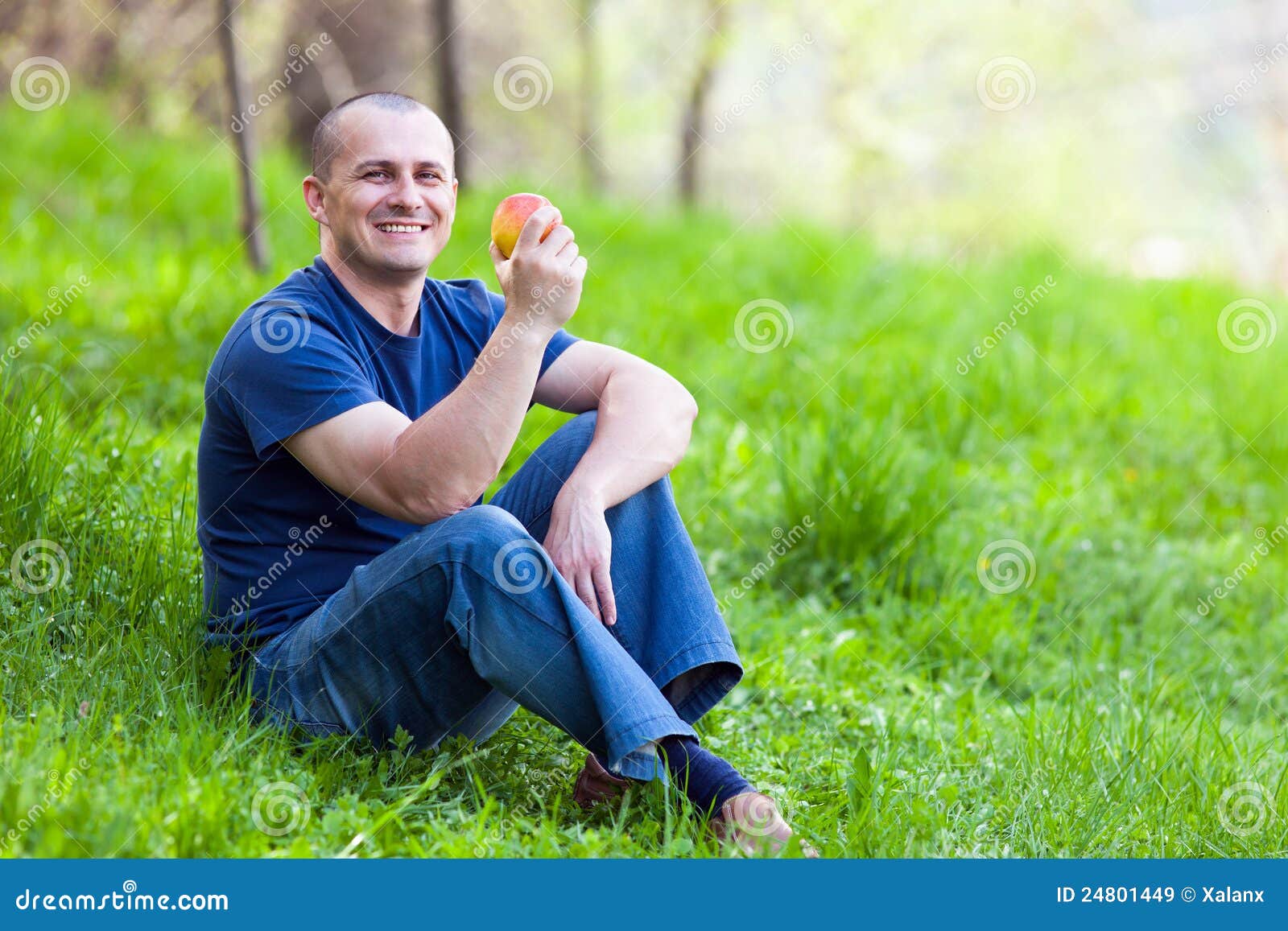 Man Eating an Apple Outdoor Stock Image - Image of male, juicy: 24801449