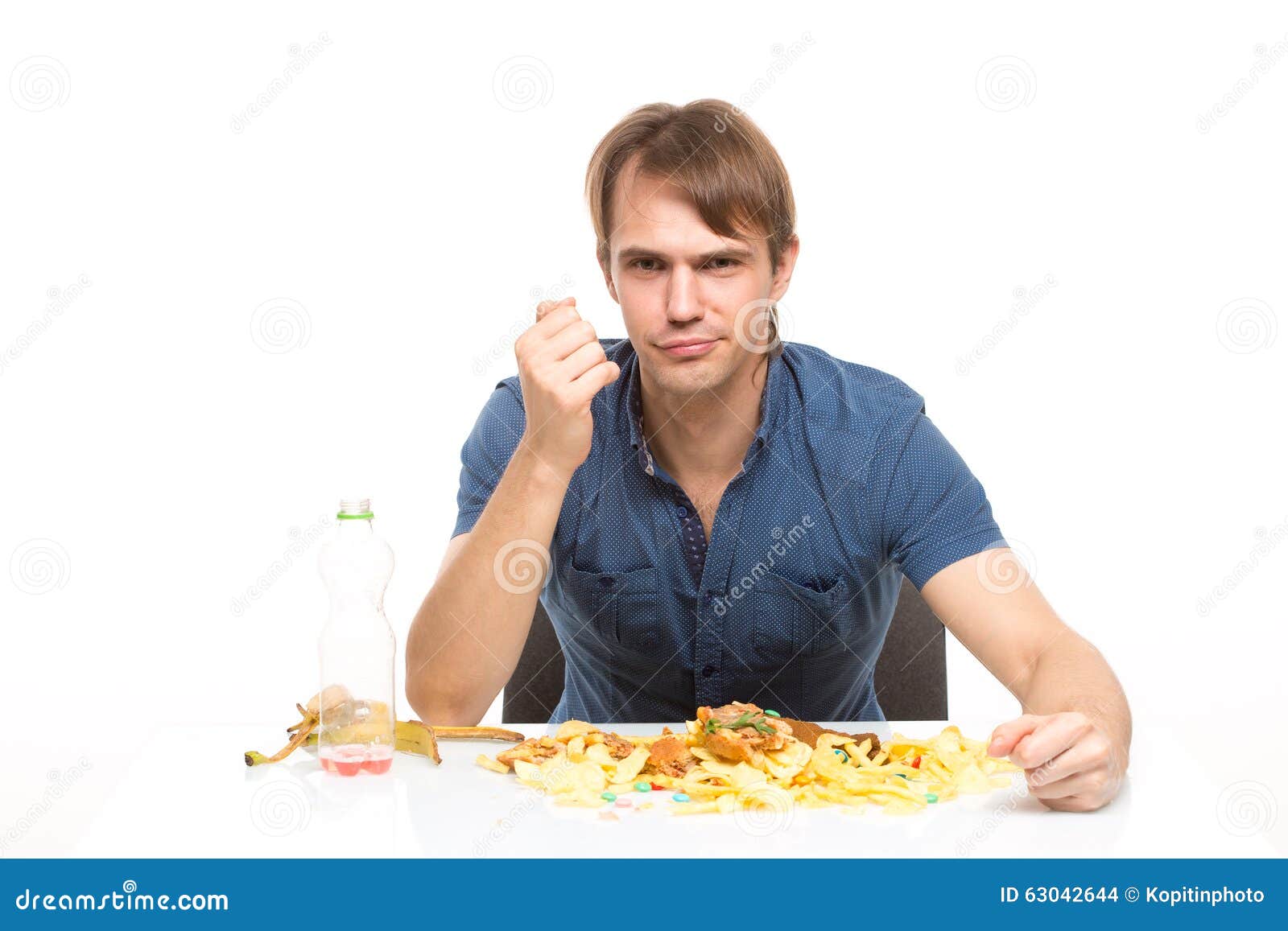 Man Eating a Banana. on the Table a Lot of Dirt Stock Photo - Image of ...