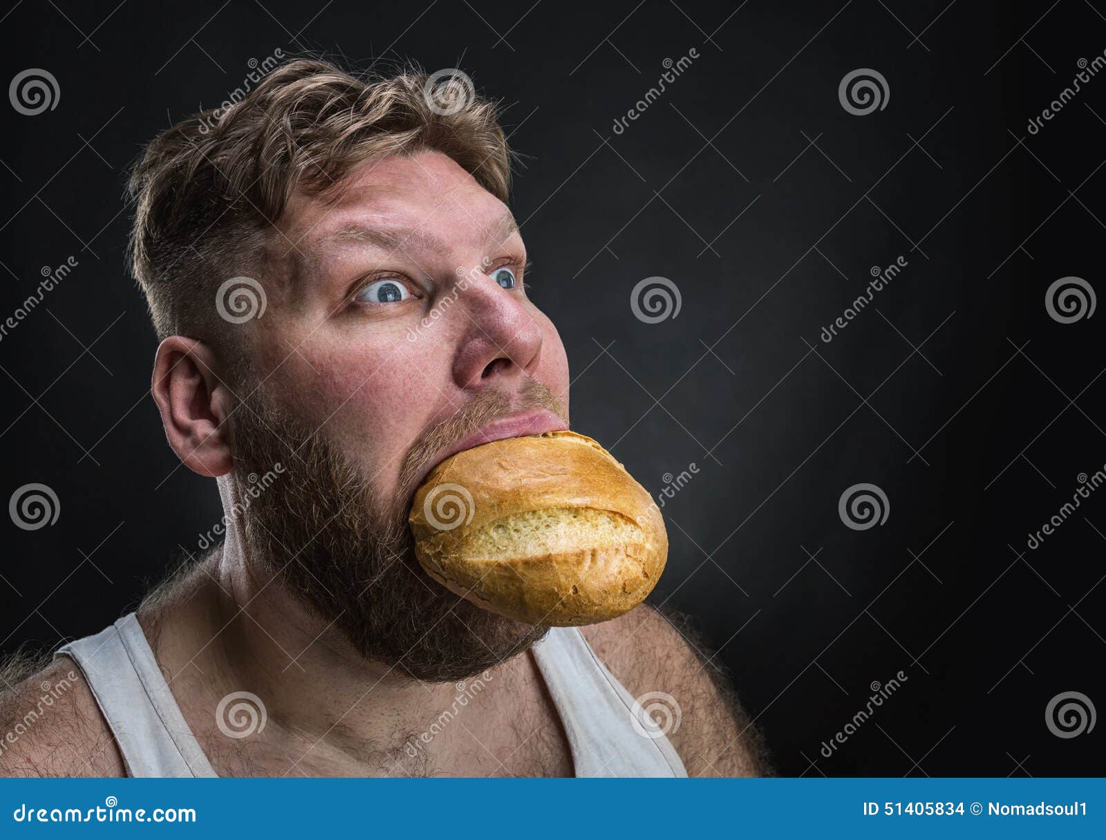 Man eating a big bread stock photo. Image of humor, glutton - 51405834