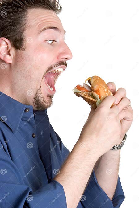 Man Eating Burger stock image. Image of teen, biting, person - 2460385