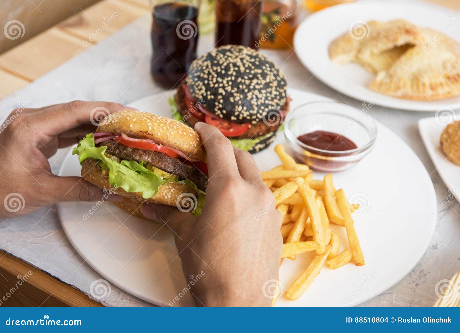 Man eating burgers stock photo. Image of burger, healthy - 88510804