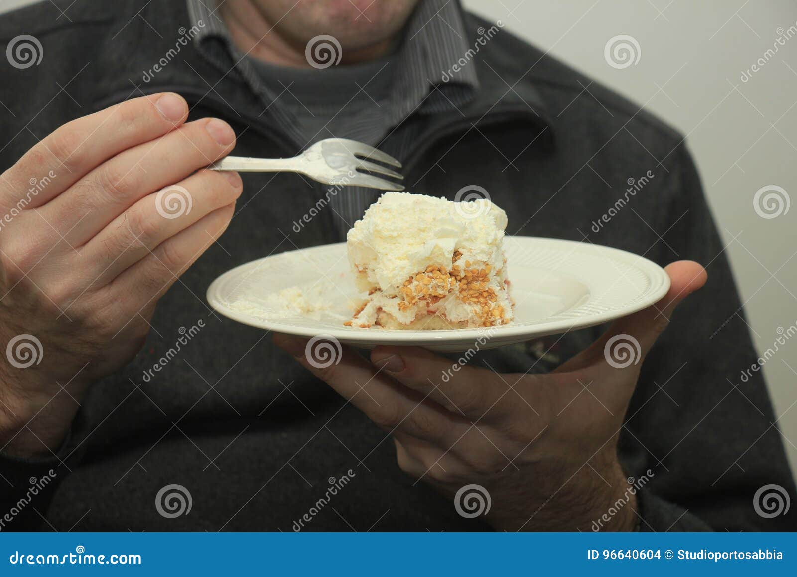 Man eating cake stock photo. Image of eating, food, cake - 96640604