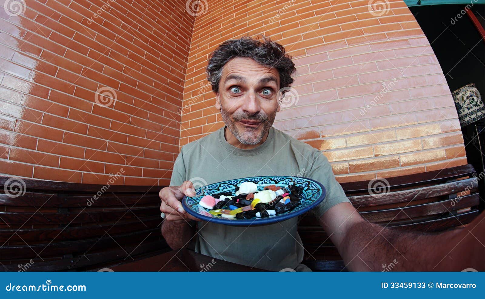 Man eating candies stock image. Image of assortment, sweet - 33459133