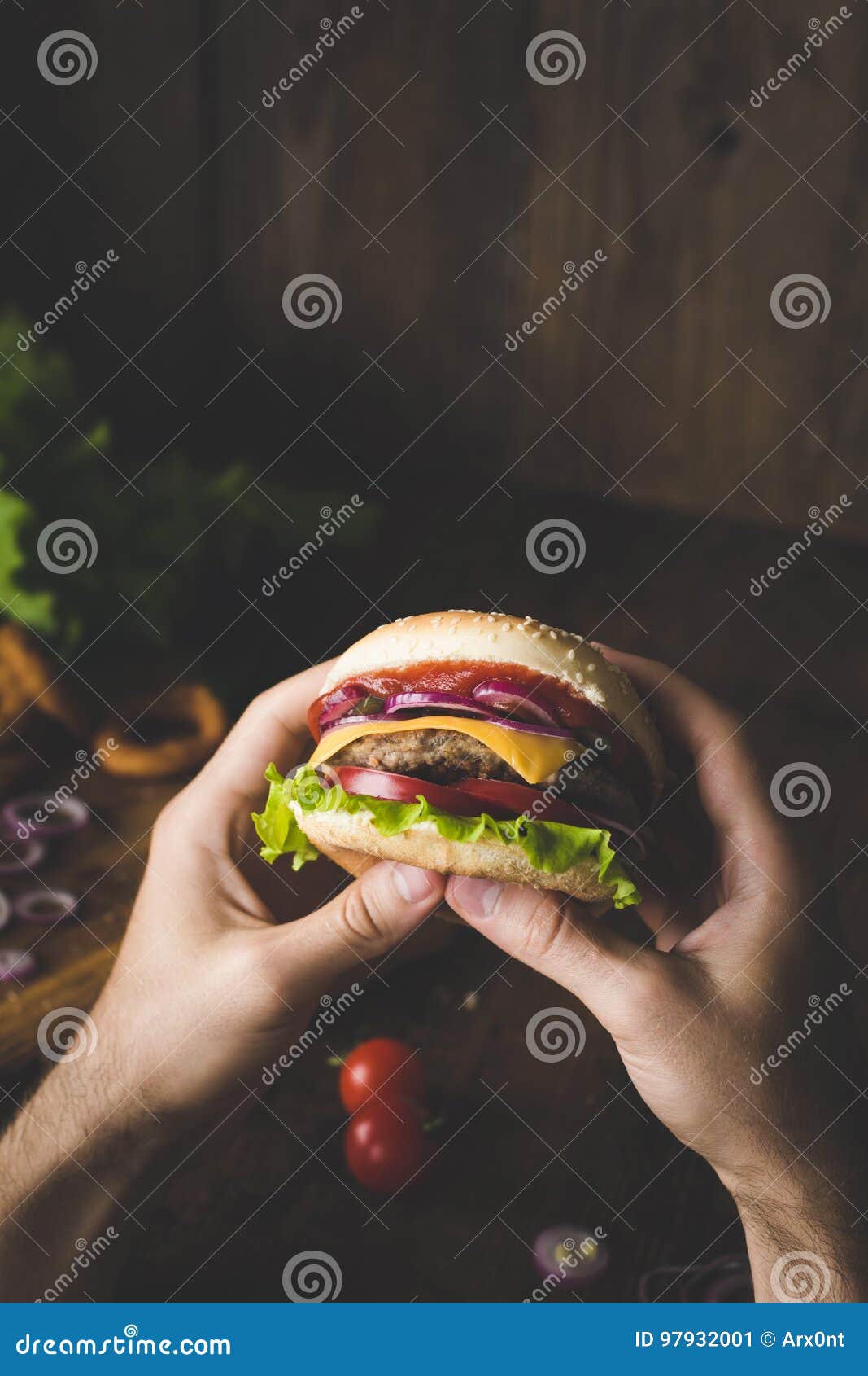 Man eating cheeseburger stock image. Image of homemade - 97932001