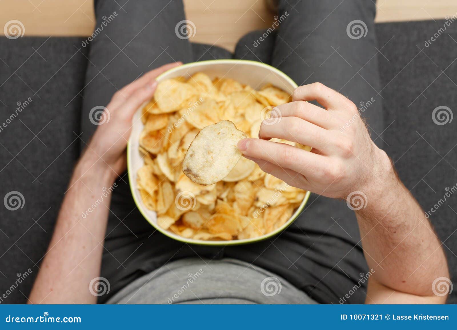 Man eating chips stock image. Image of look, lifestyle - 10071321