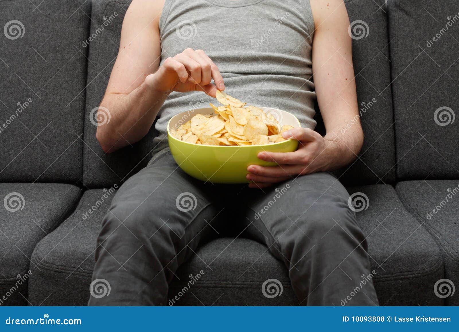 Man eating chips stock photo. Image of bowl, entertainment - 10093808