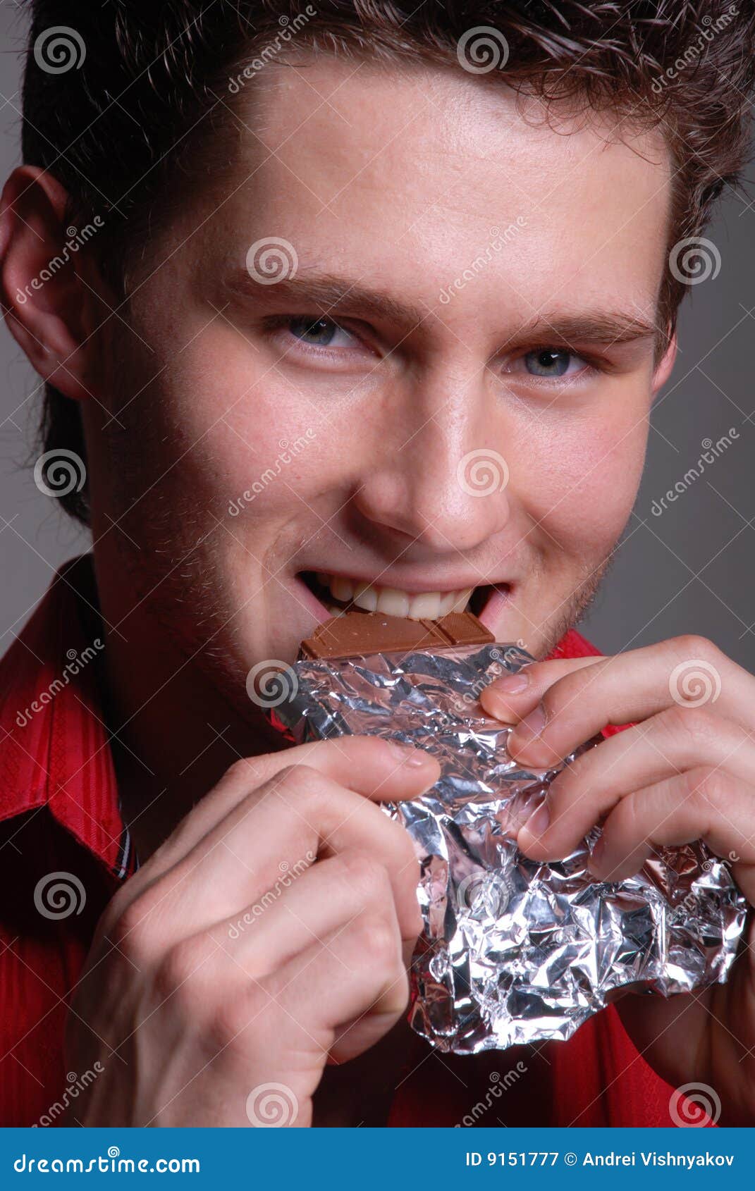 Man eating chocolate stock image. Image of food, like - 9151777