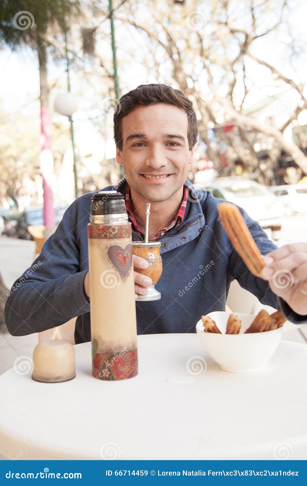 Man eating churro stock image. Image of executive, beverage - 66714459