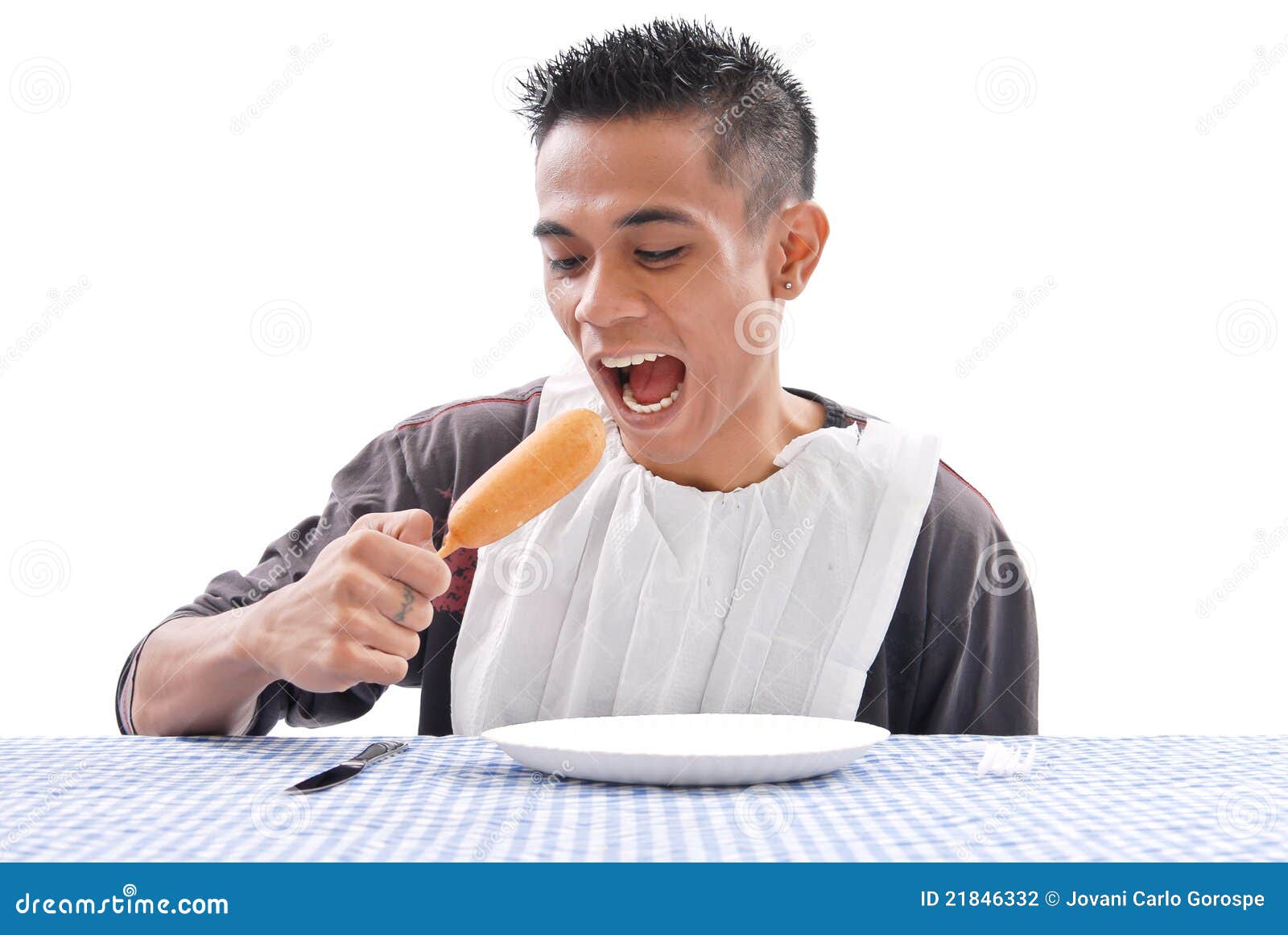 Man Eating a Corn Dog stock photo. Image of concept, cuisine - 21846332