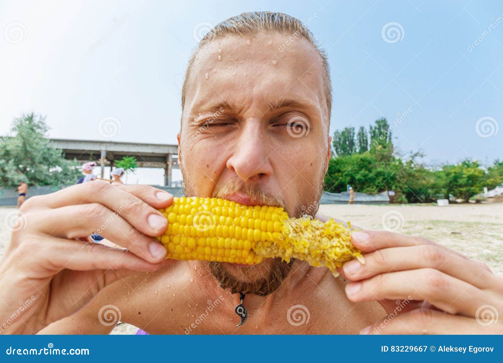 Man is eating corn stock image. Image of health, people - 83229667
