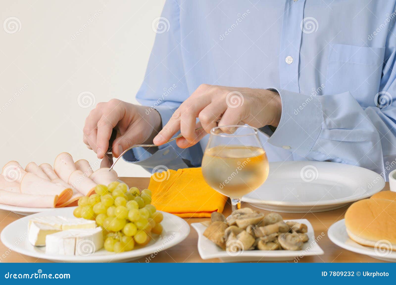 Man eating dinner stock photo. Image of indoors, eating - 7809232