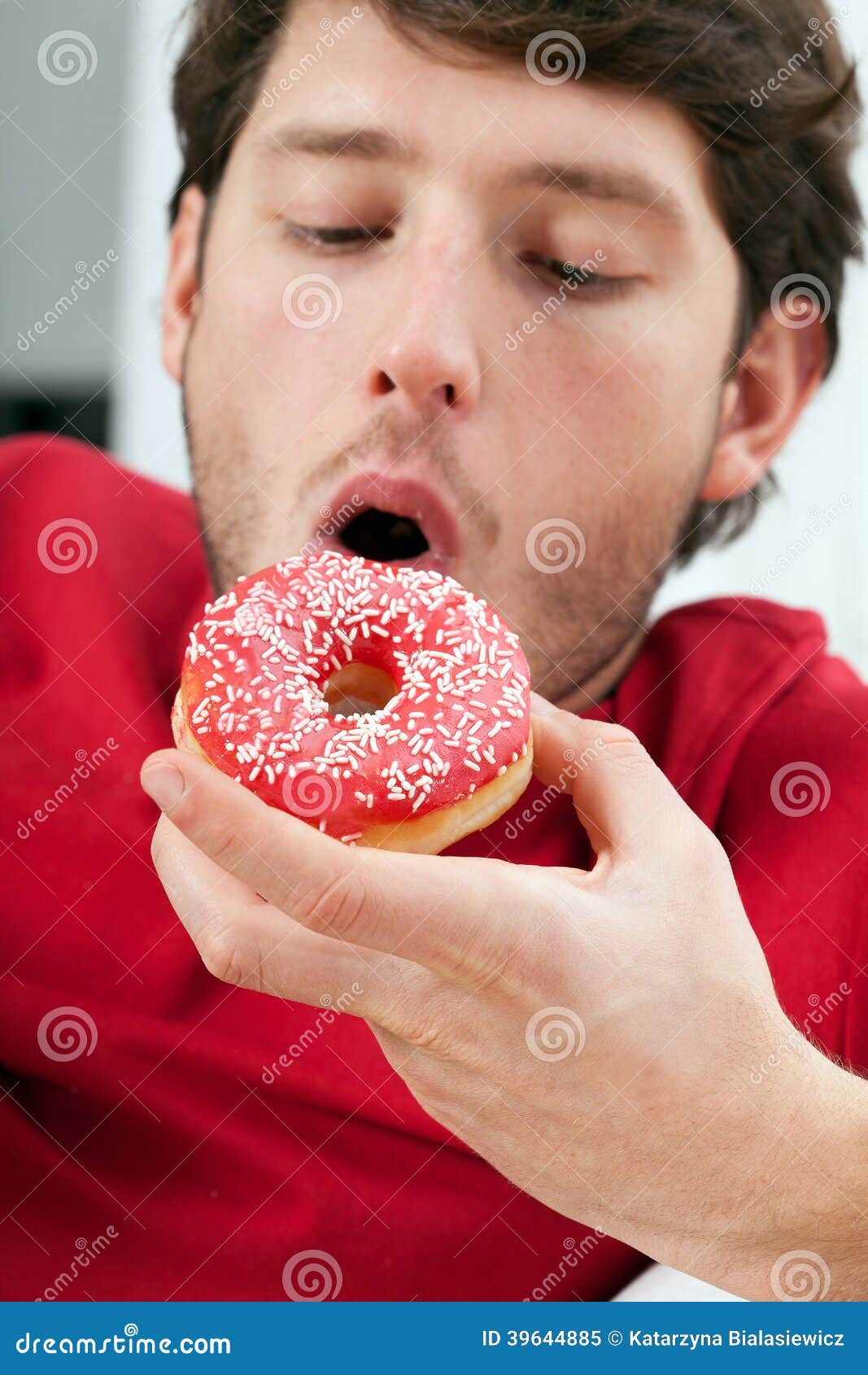 Man eating donut stock image. Image of idleness, glutton - 39644885