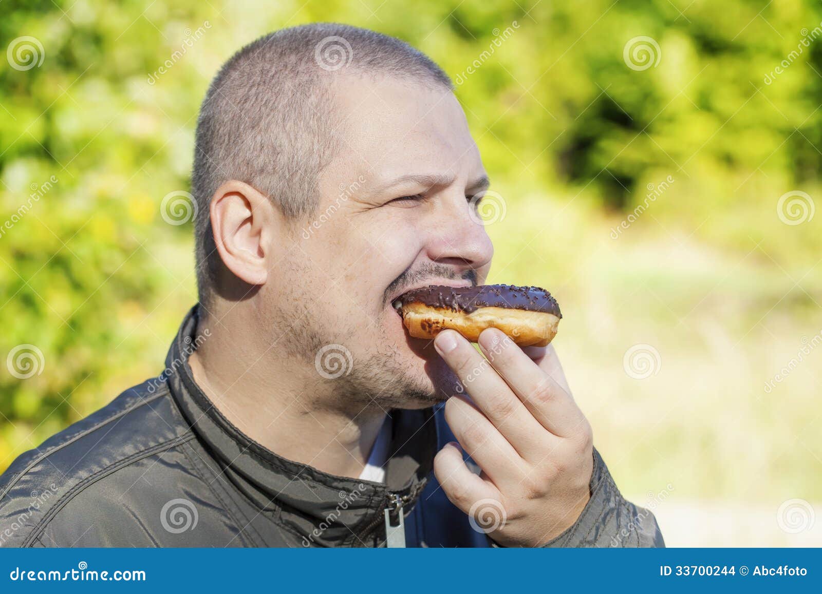 Man eating donuts stock photo. Image of figure, fatness - 33700244