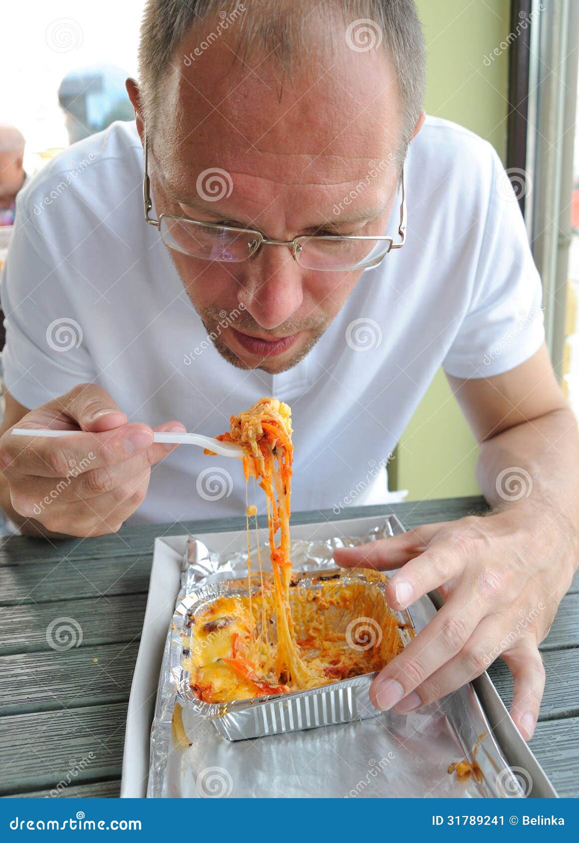 Man eating fast food stock image. Image of executive - 31789241