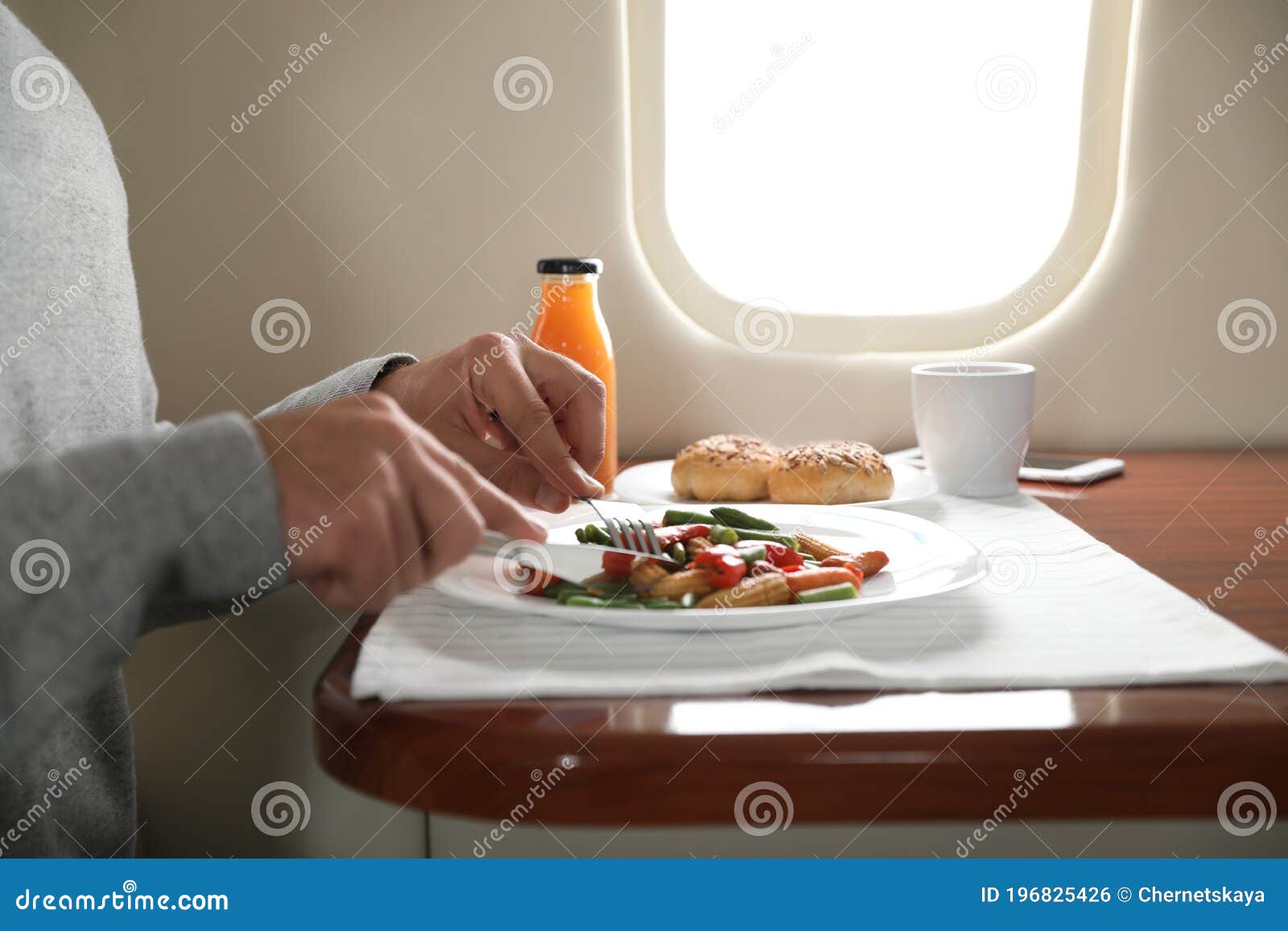 Man Eating during Flight, Closeup. Air Travel Stock Photo - Image of ...