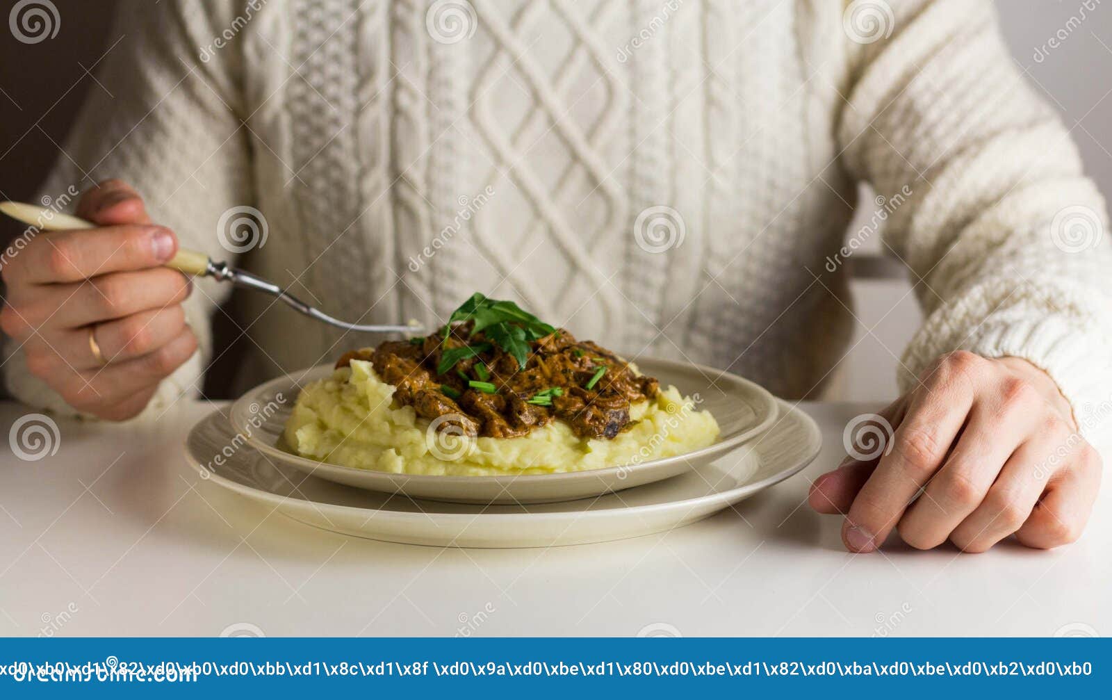 Man Eating with Fork the Beef Stroganoff and Mashed Potatoes Stock ...