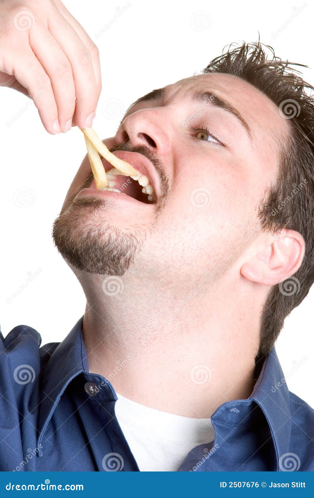 Man Eating French Fries stock photo. Image of eating, lunch - 2507676