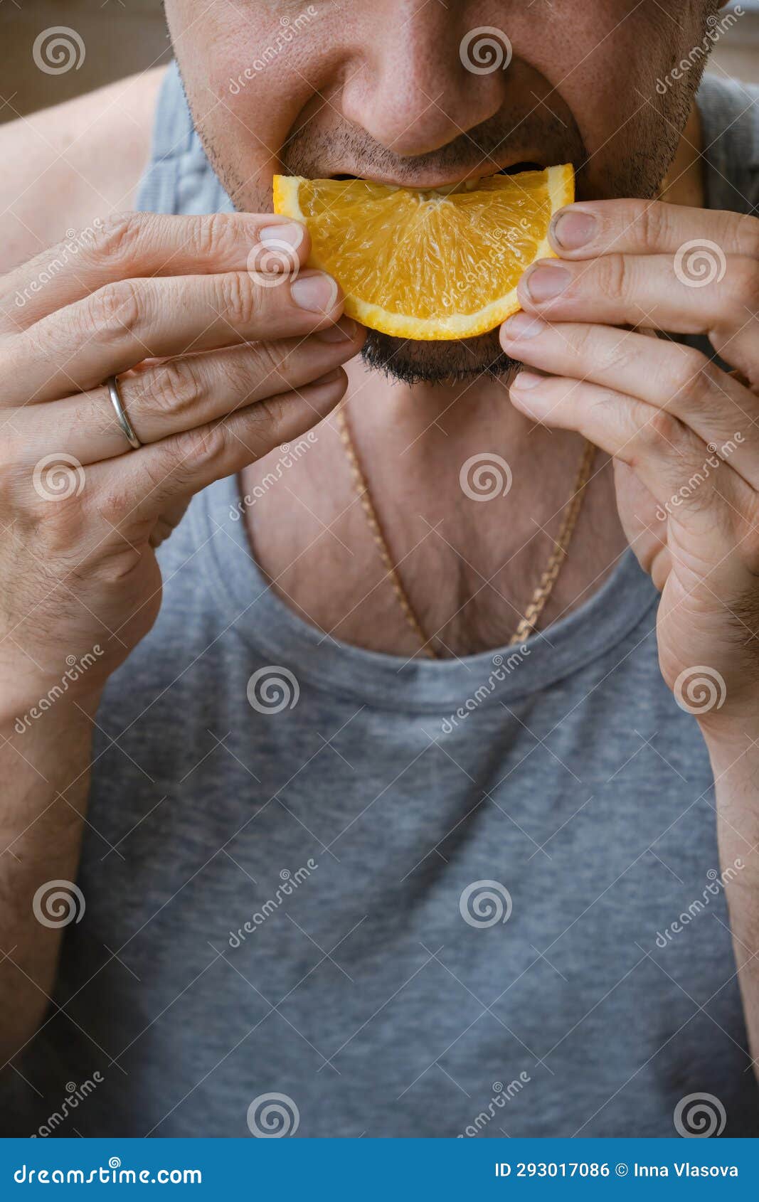 Man Eating a Fresh Orange at Home Stock Photo - Image of mouth, organic ...