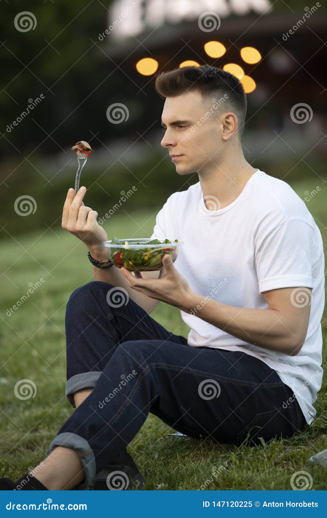 Man Eating Fresh Salad at Summer, Holding Fork with Meat Stock Image ...
