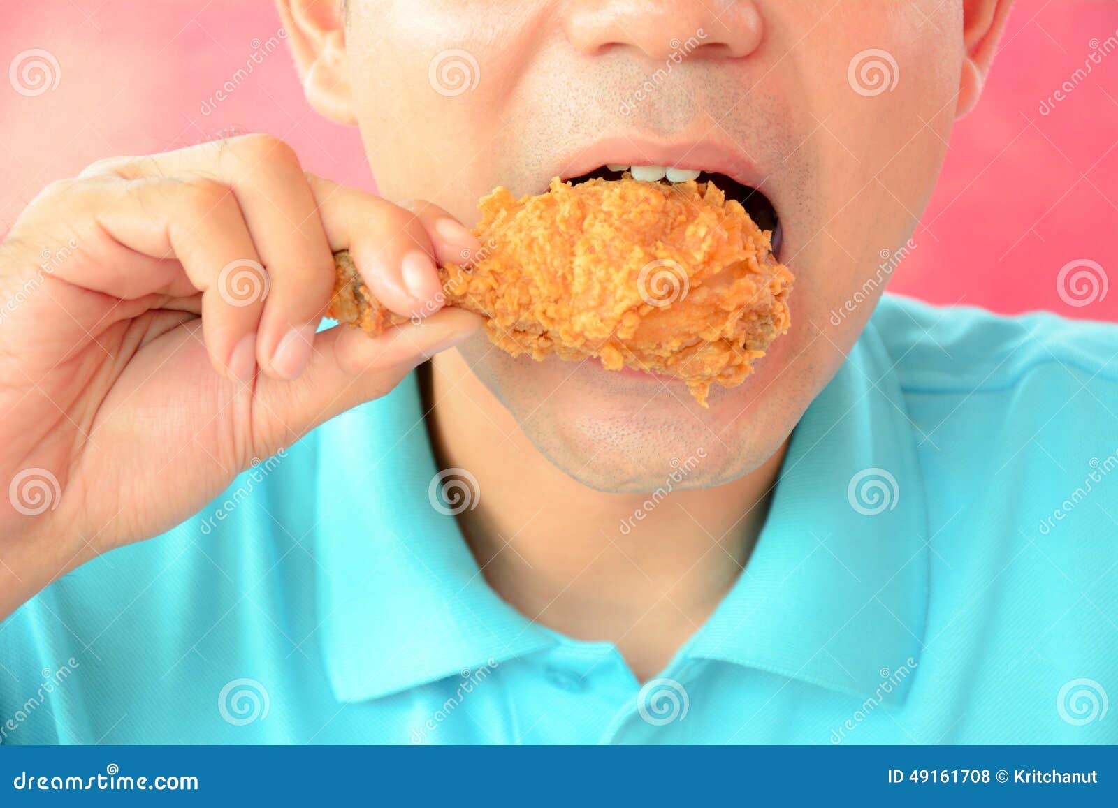 A Man Eating Fried Chicken Leg or Drumstick Stock Photo - Image of ...
