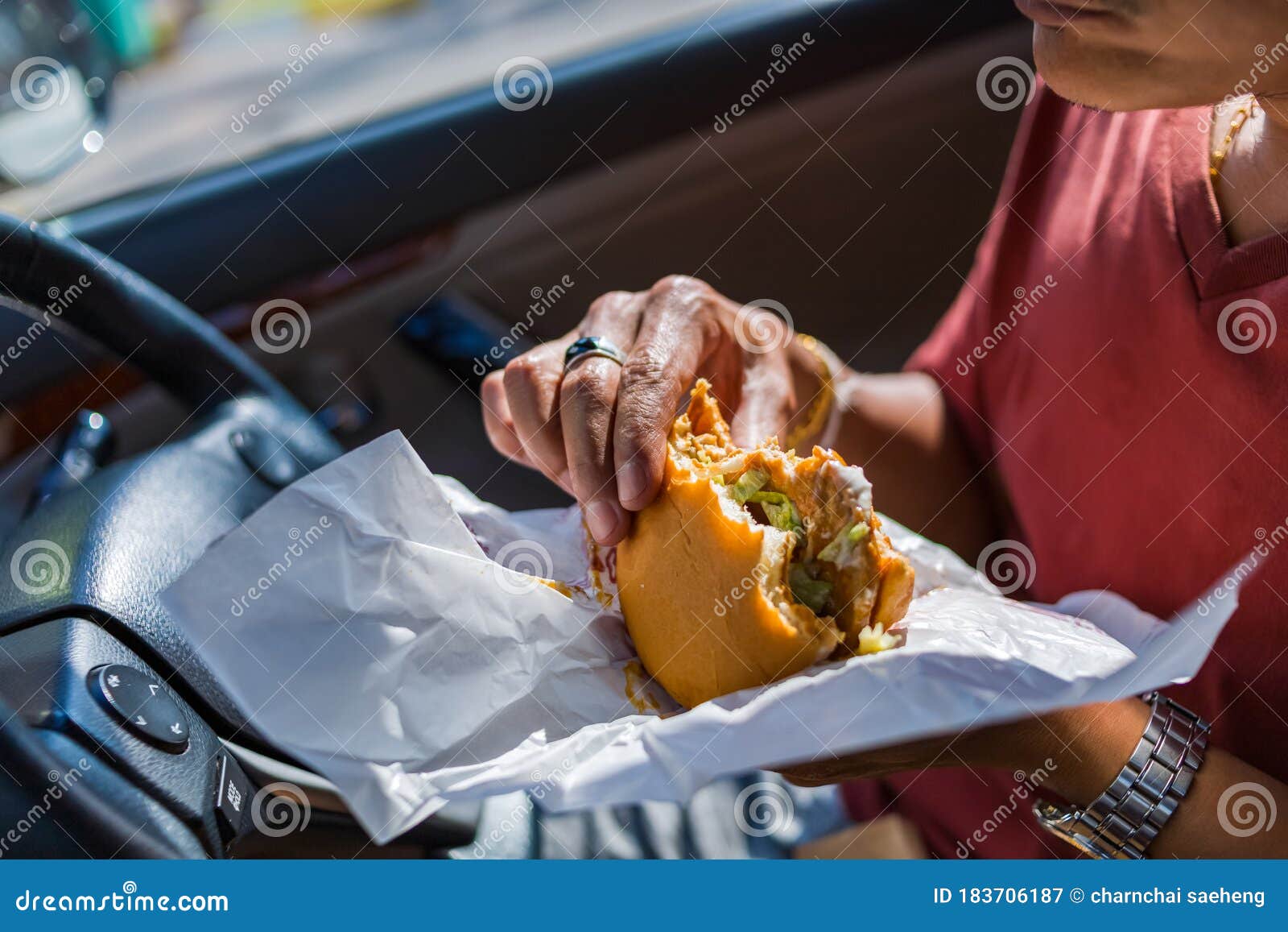 Man Eating Hamburger in Car Stock Image - Image of food, lifestyle ...