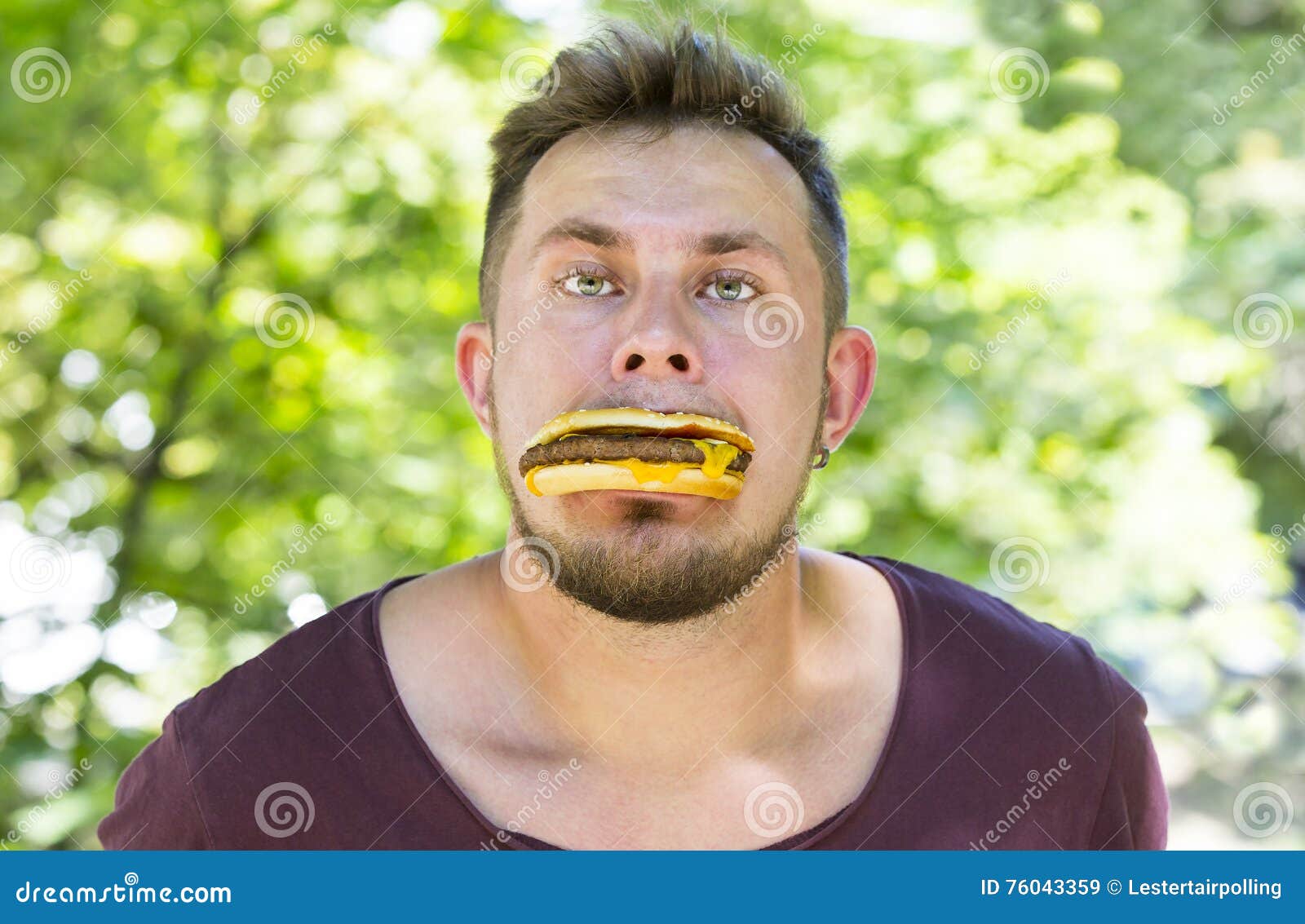Man eating a hamburger stock image. Image of burger, large - 76043359