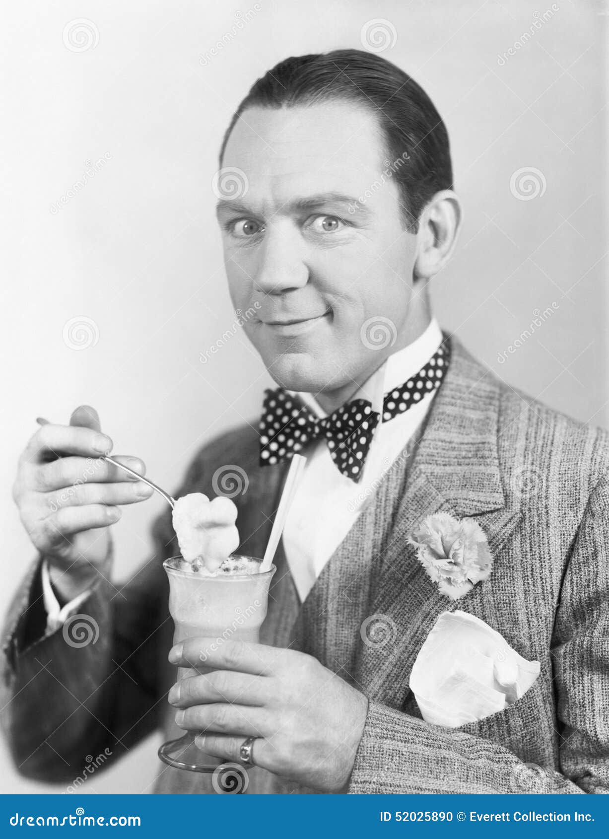 Man Eating an Ice-cream Out of a Glass with a Straw Stock Photo - Image ...