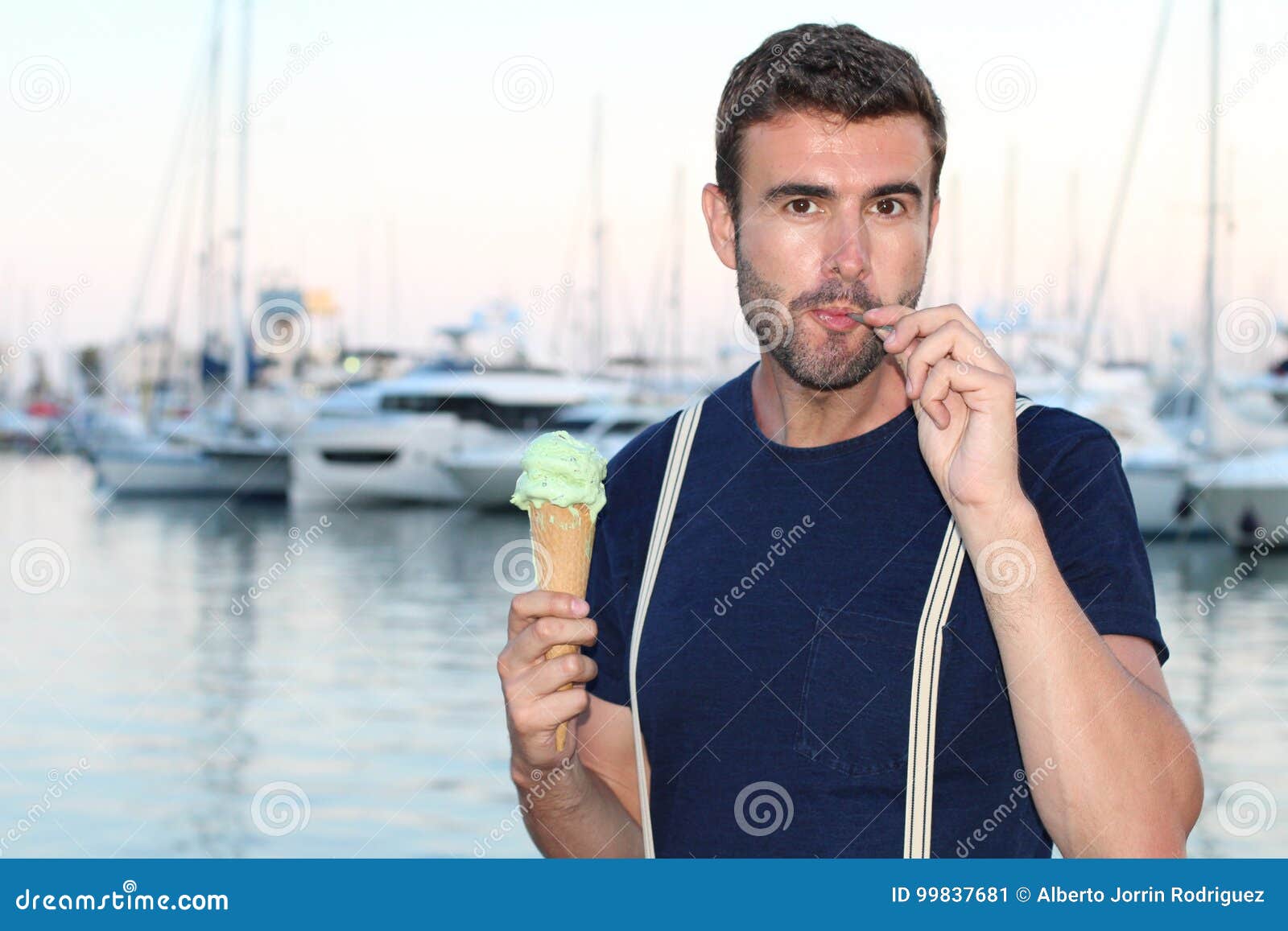 Man Eating an Ice Cream with a Spoon Stock Image - Image of harbor ...
