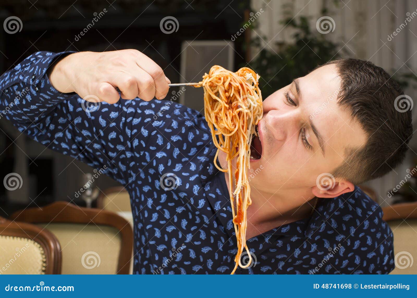 Man Eating a Large Portion of Pasta Stock Photo - Image of happiness ...