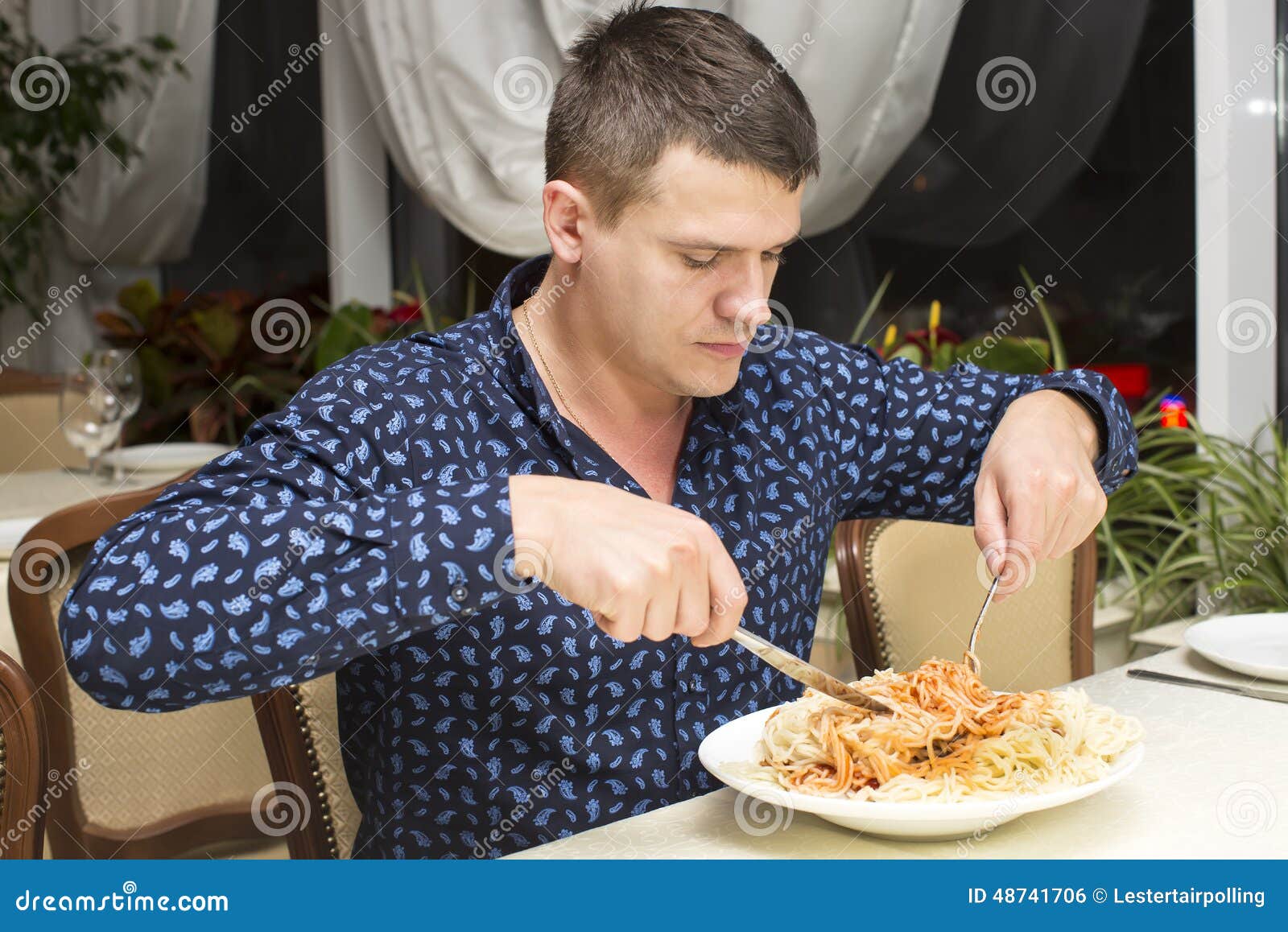 Man Eating a Large Portion of Pasta Stock Photo - Image of male ...