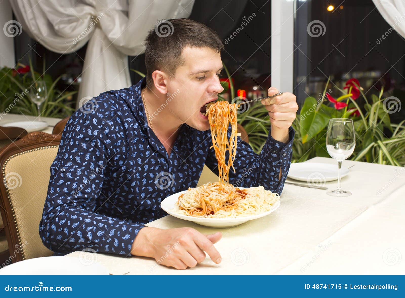Man Eating a Large Portion of Pasta Stock Image - Image of adult ...