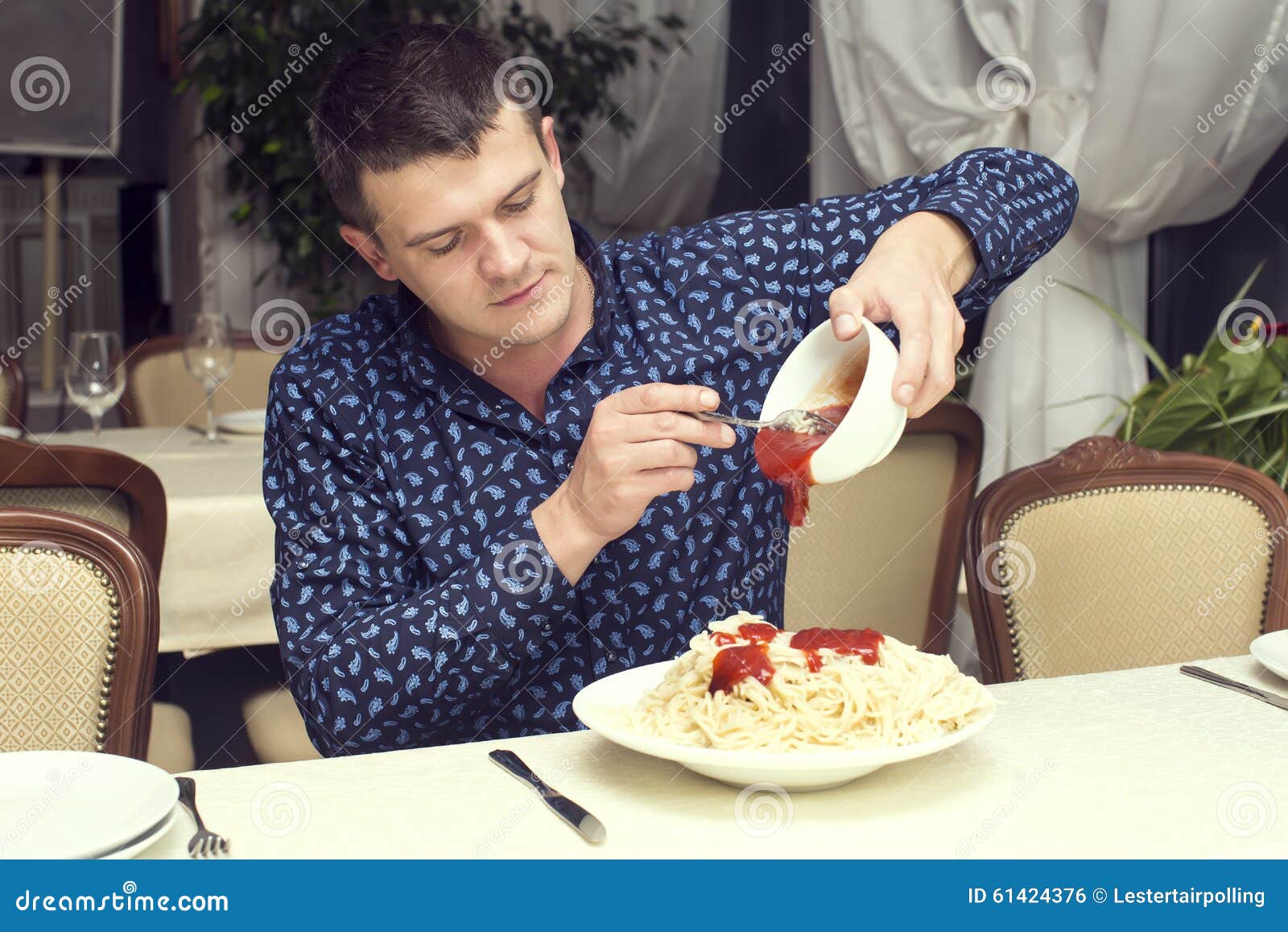 Man Eating a Large Portion of Pasta Stock Photo - Image of adult ...