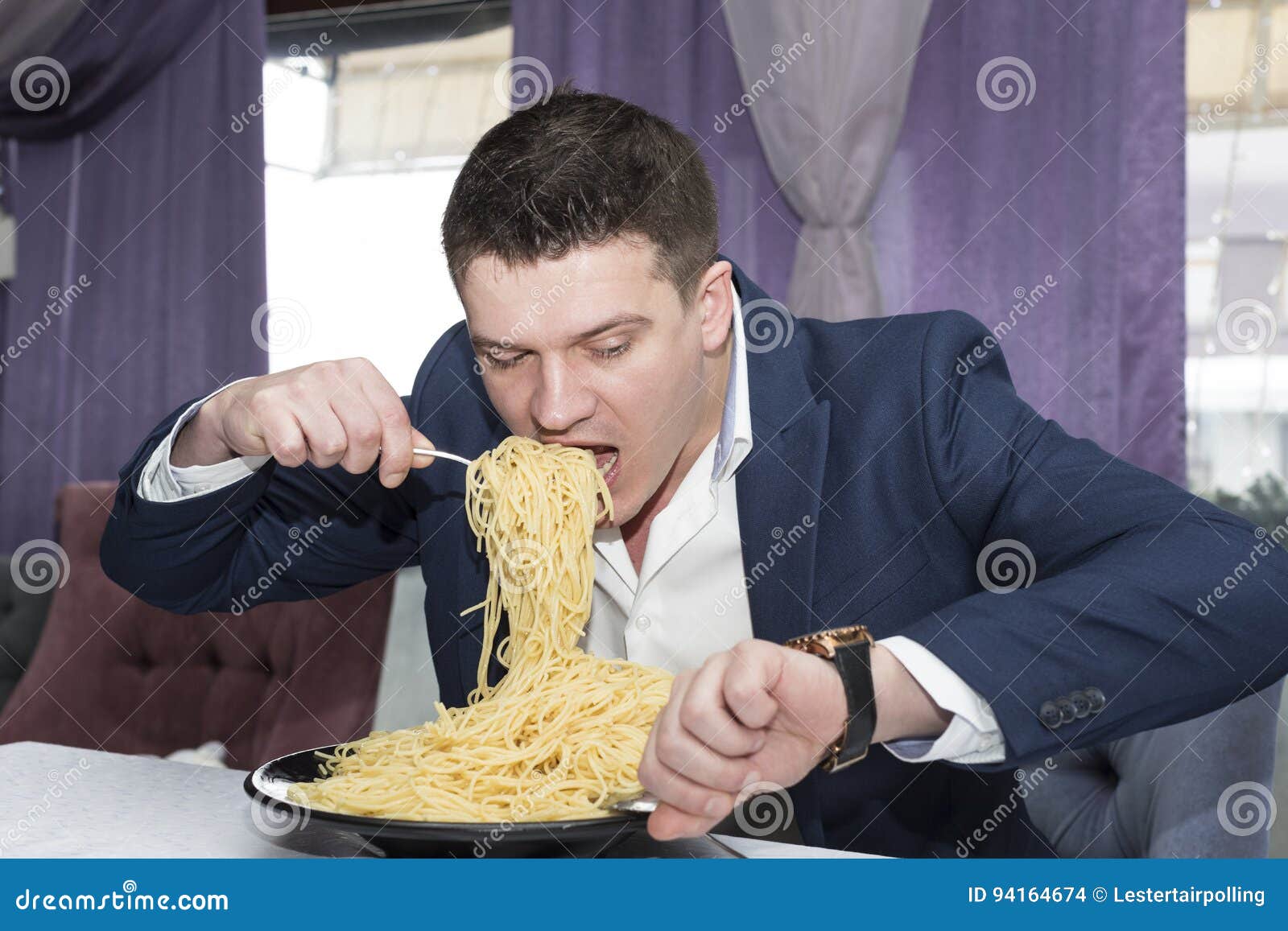 Man Eating a Large Portion of Pasta Stock Photo - Image of happiness ...