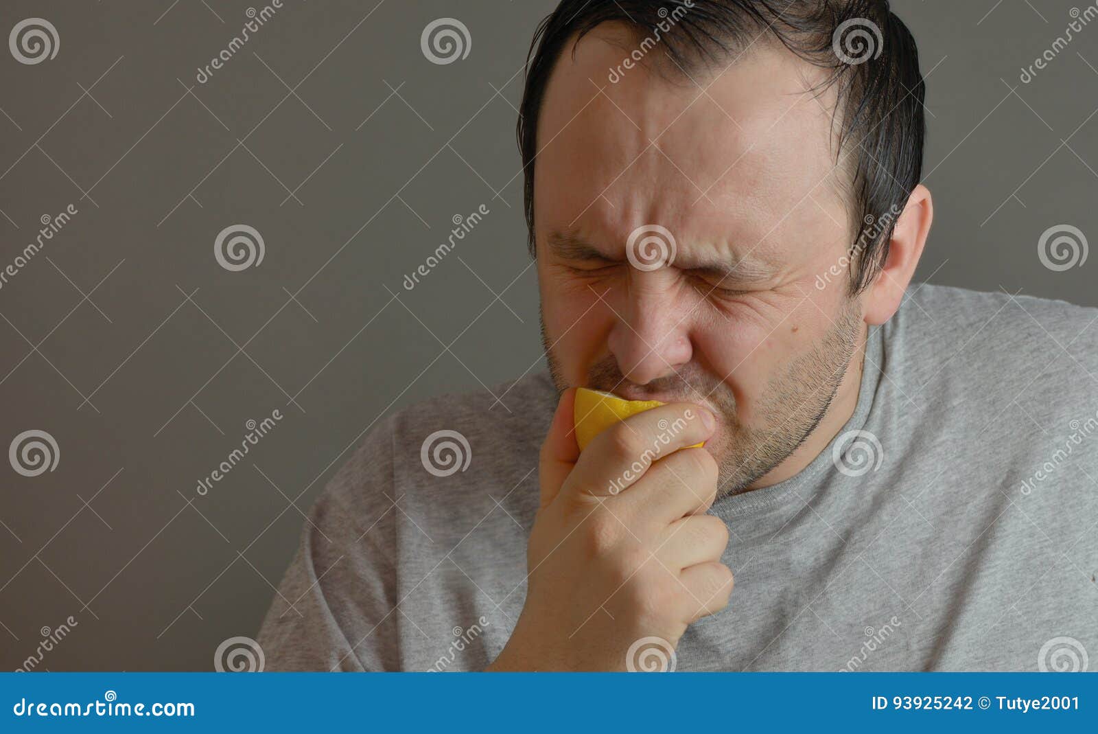 Man Eating Lemon and Making Silly Faces Stock Photo - Image of isolated ...