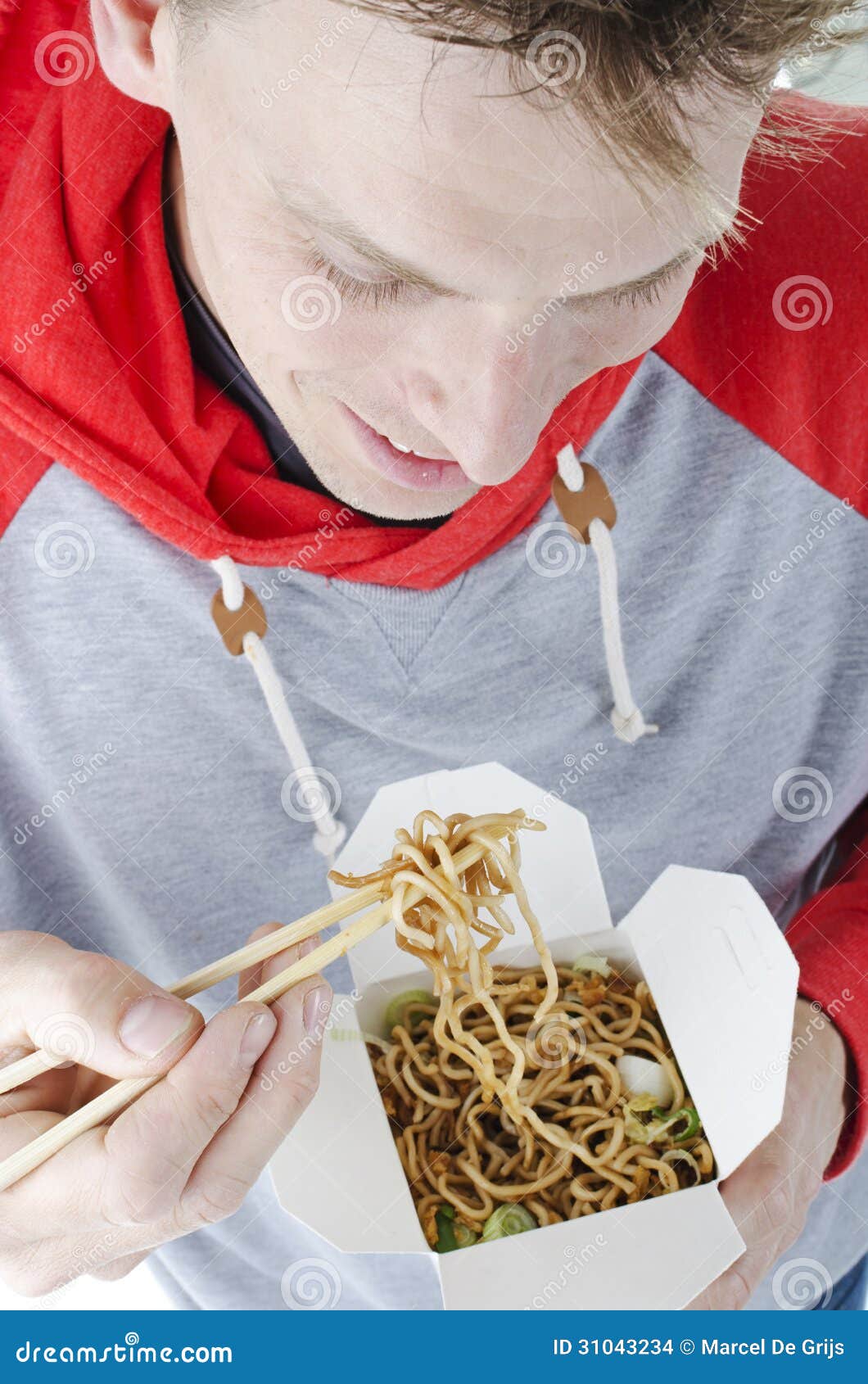 Man eating noodles stock photo. Image of noodle, delivery - 31043234